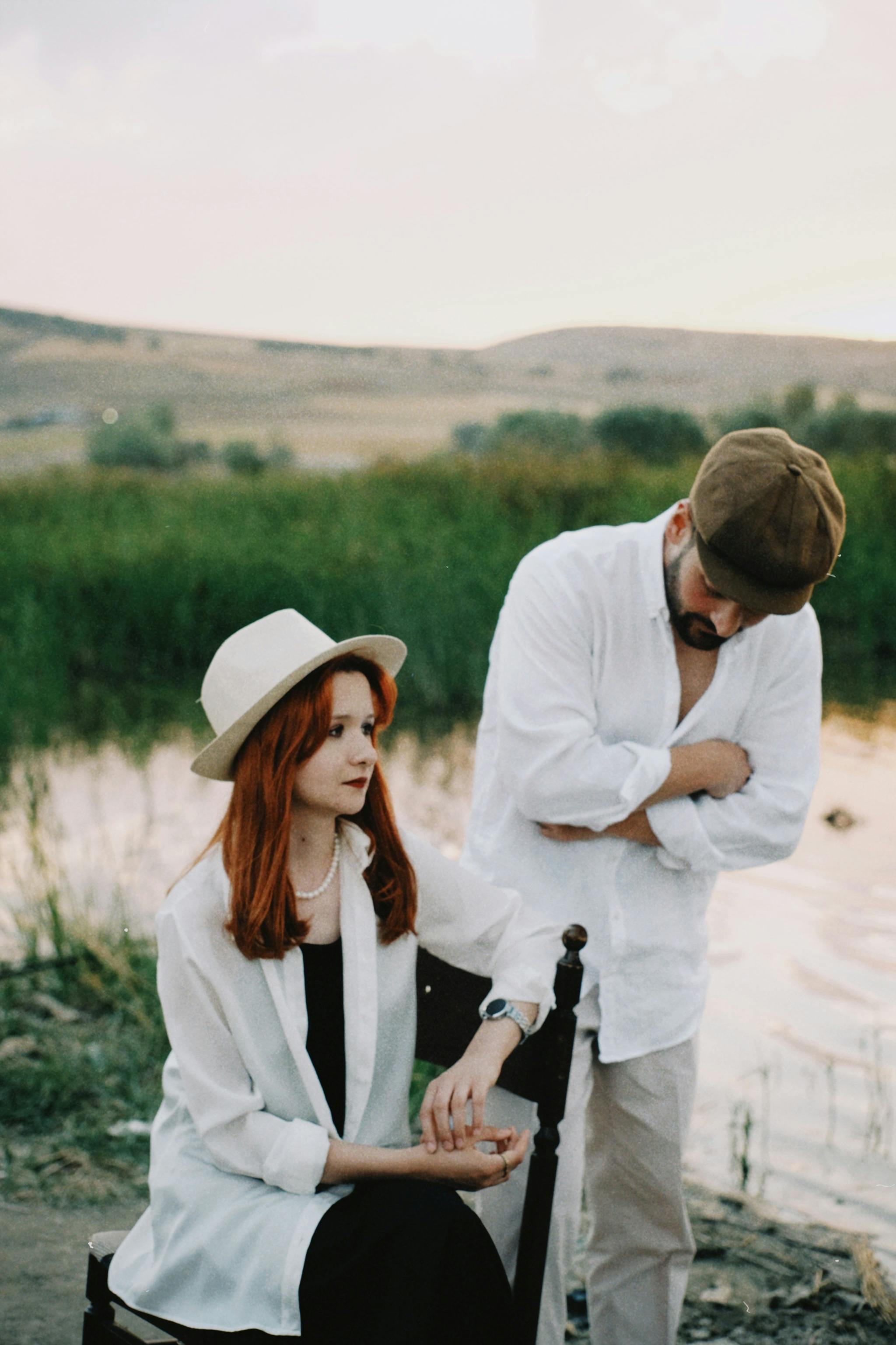 Elegant Man and Woman Posing Outside · Free Stock Photo