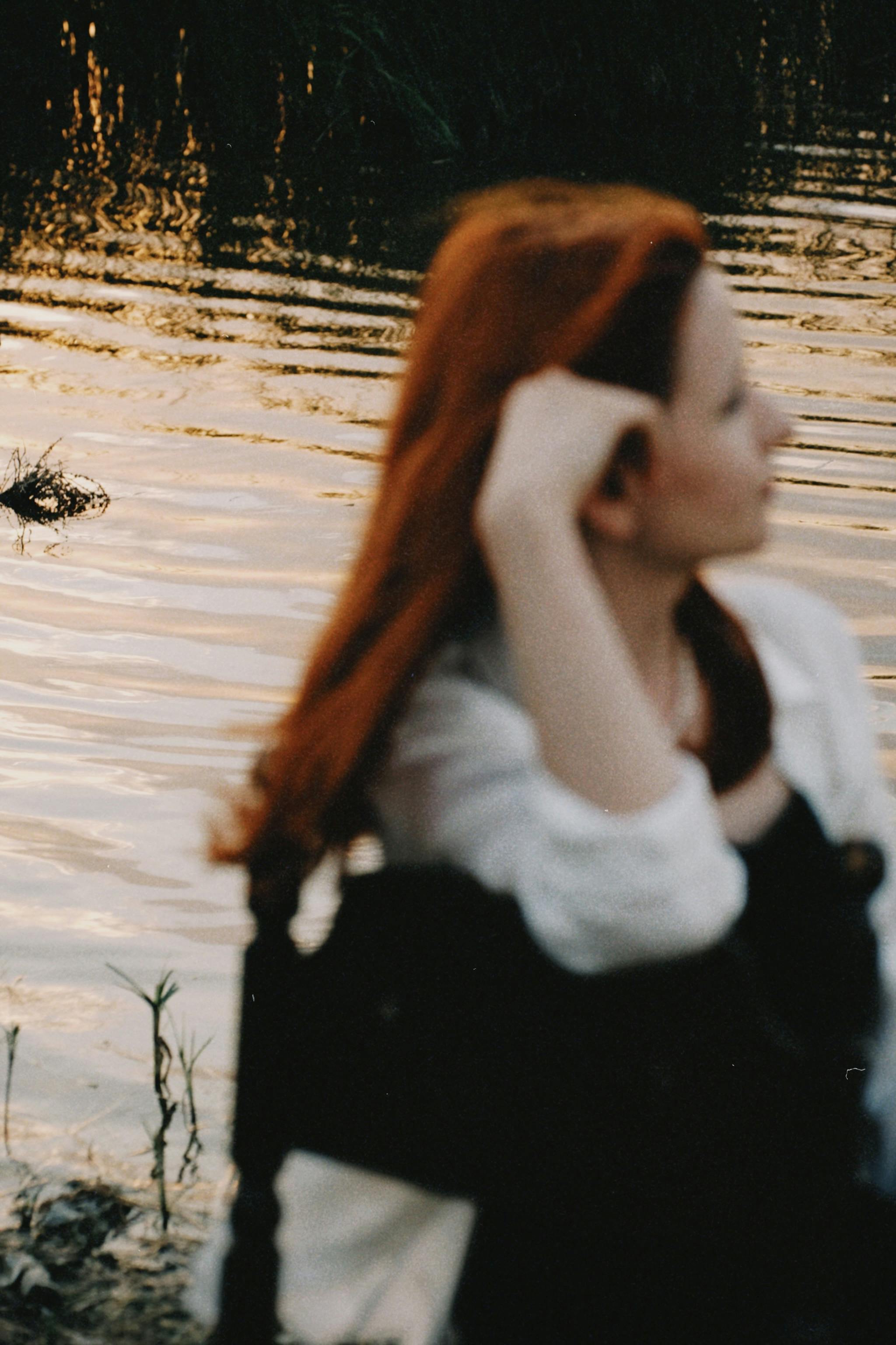 Portrait of a Woman by the Lake · Free Stock Photo