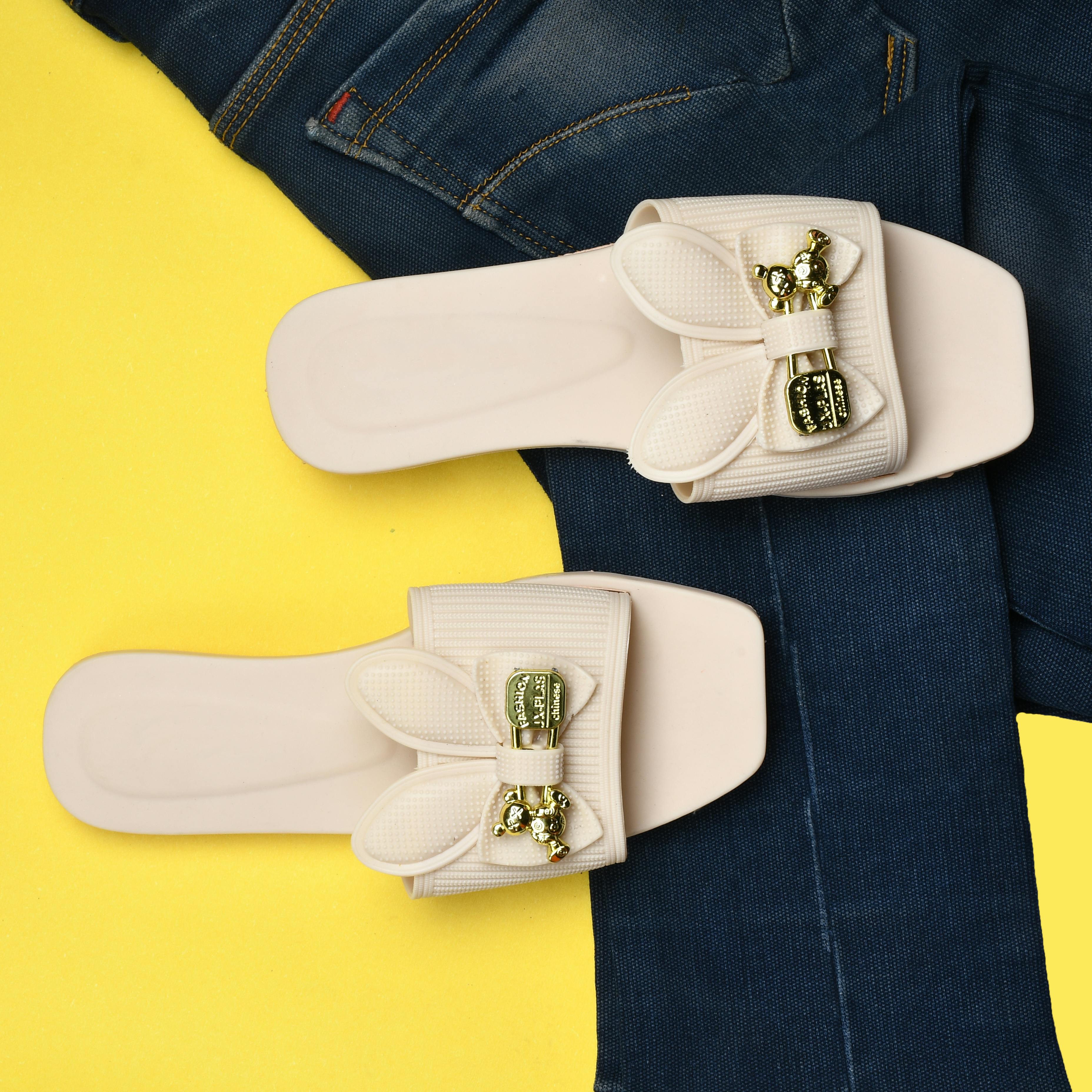 Top View Photo of Slippers On Seashore · Free Stock Photo