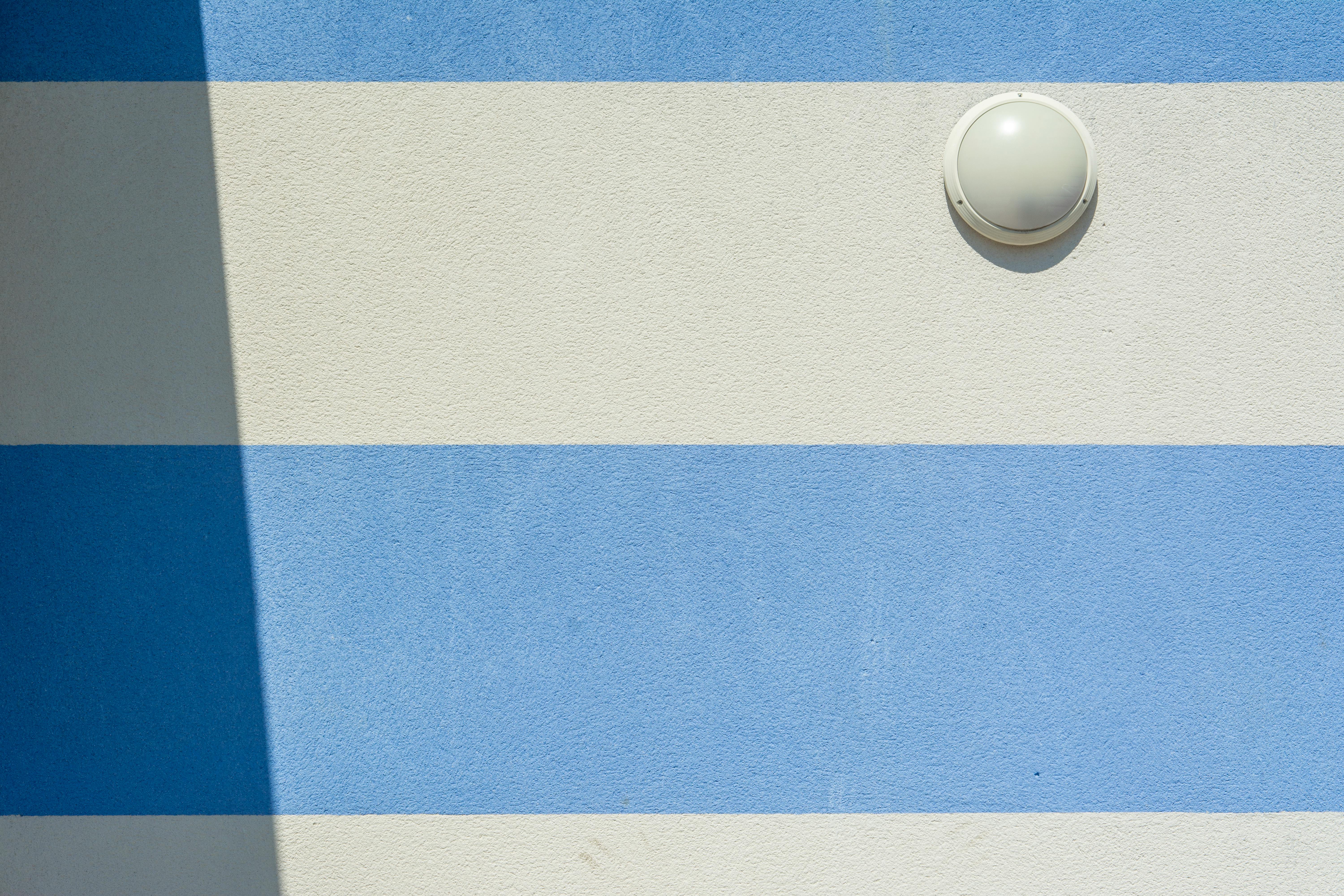 White and Blue Building Facade · Free Stock Photo