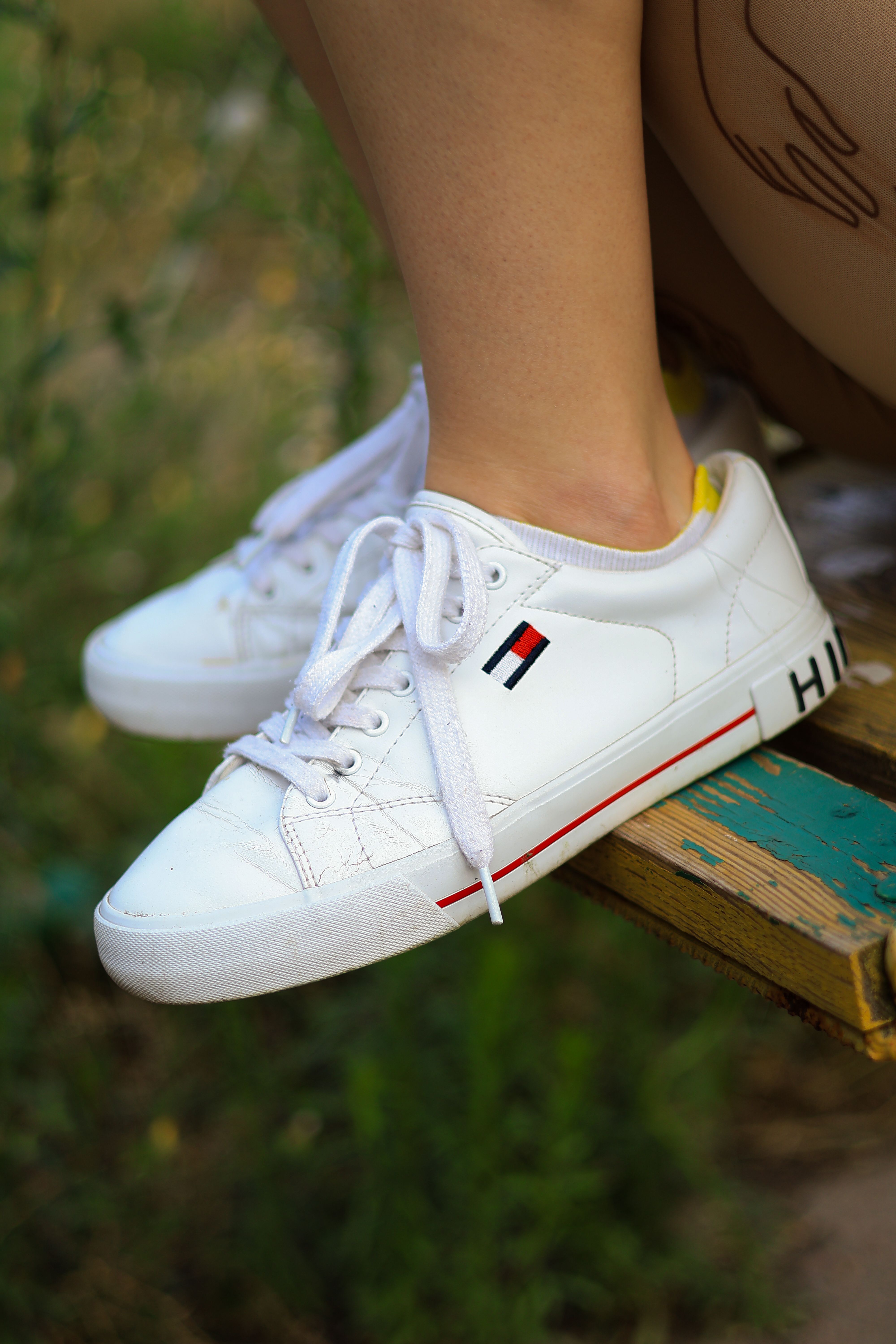 White Trainers on Feet · Free Stock Photo