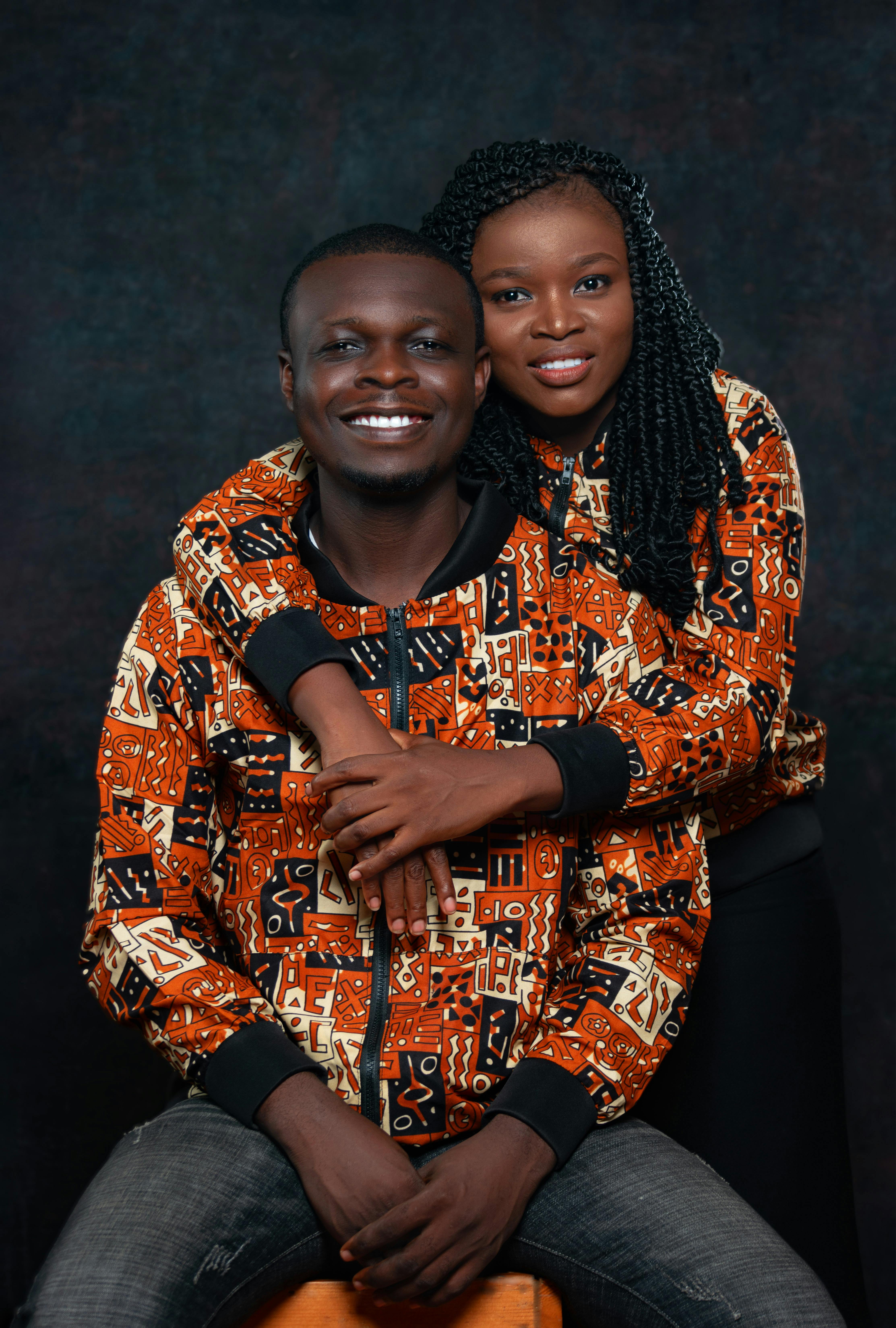 Smiling Couple in the same Jackets · Free Stock Photo