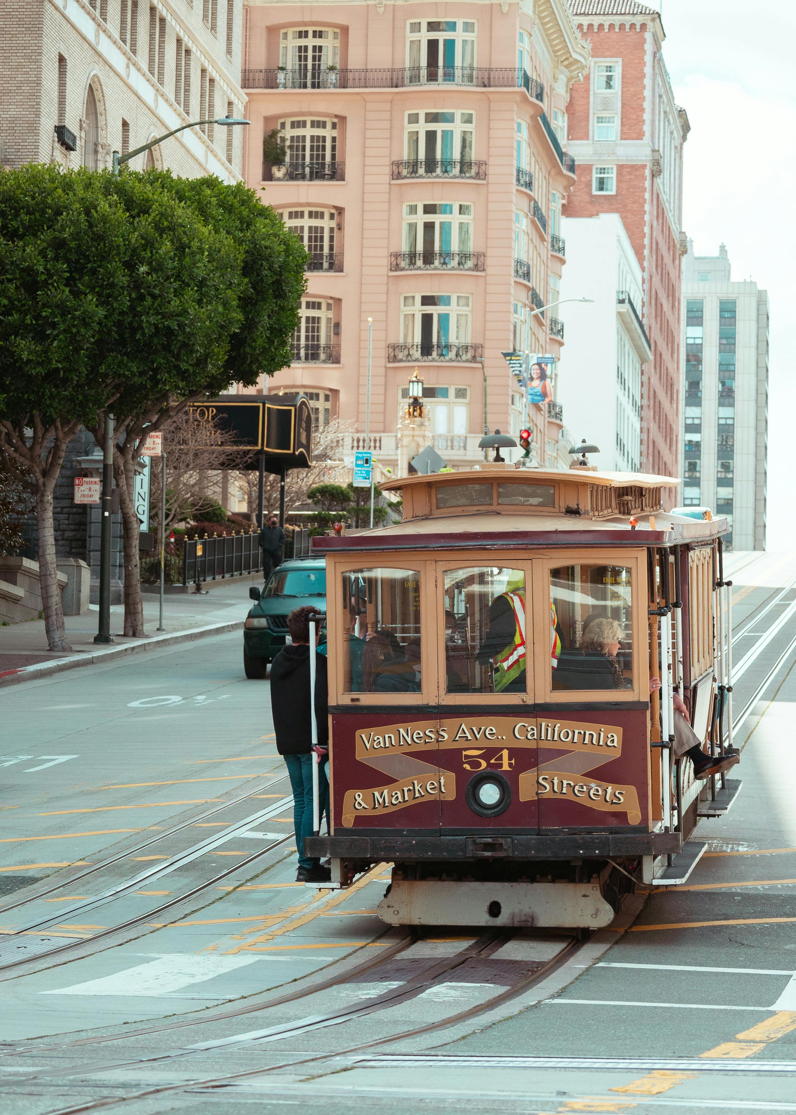 Retro Cable Car Driving on a San Francisco Street, USA · Free Stock Photo