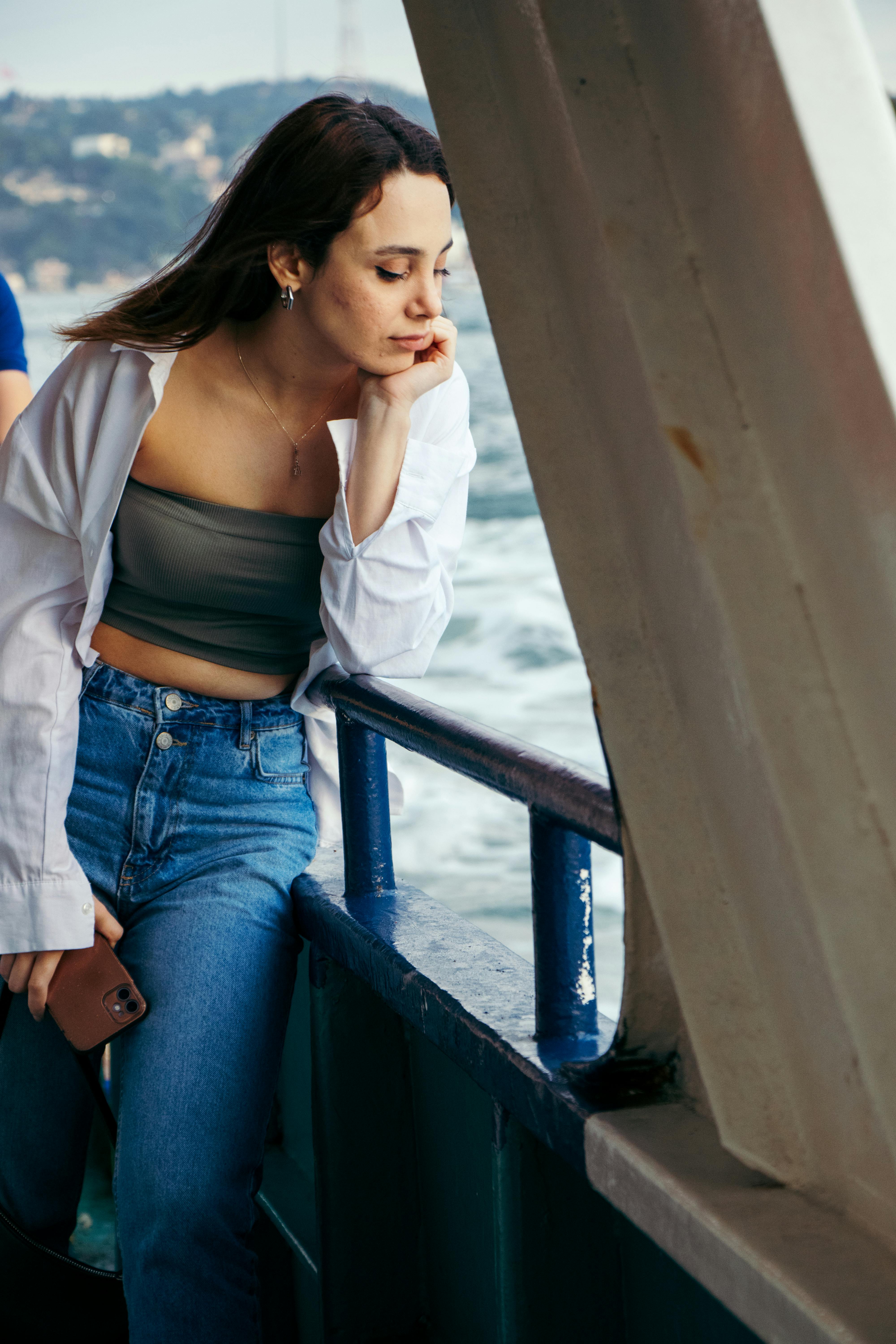 Woman Looking over Railing · Free Stock Photo