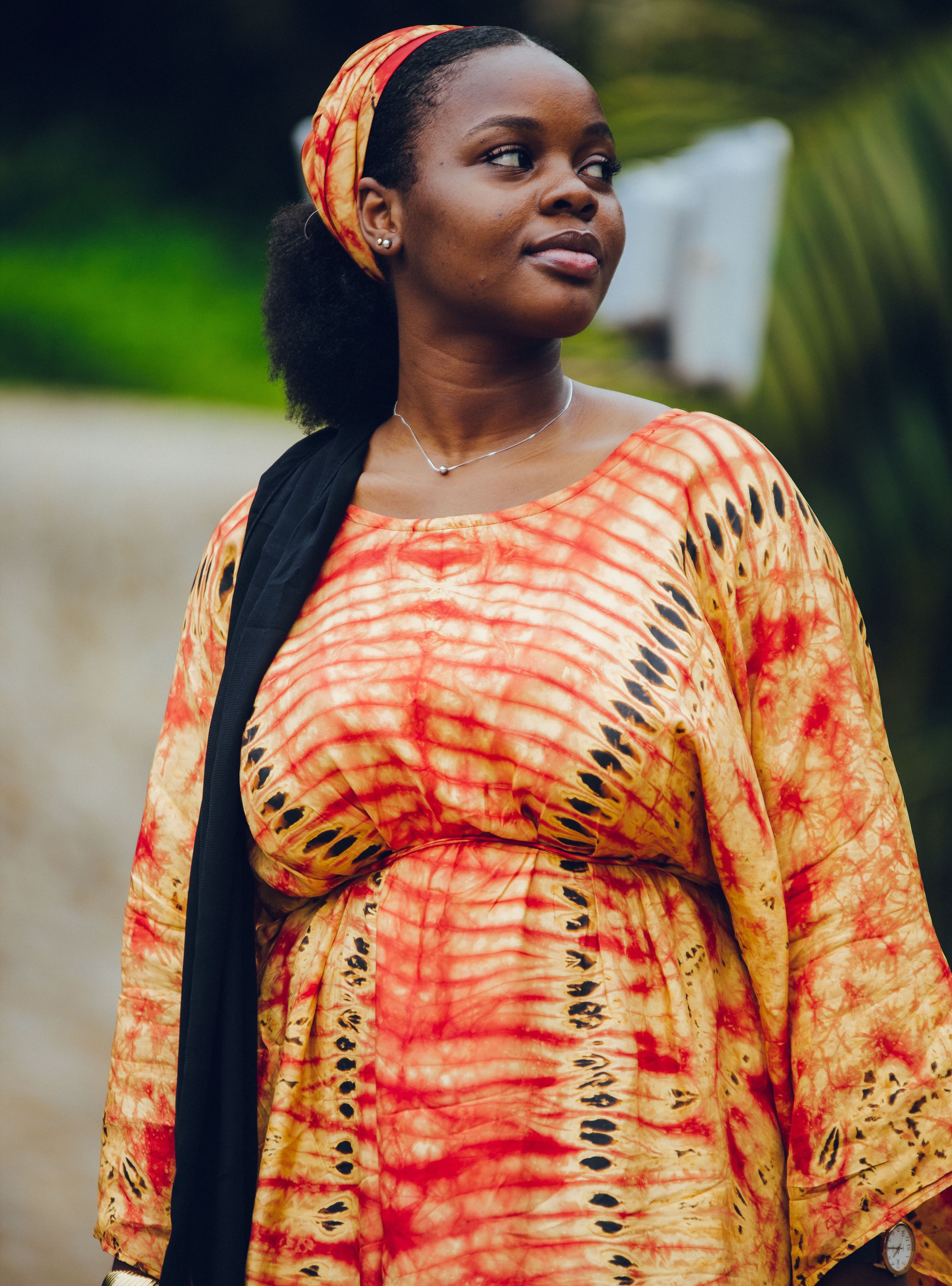 Woman in Patterned Dress · Free Stock Photo