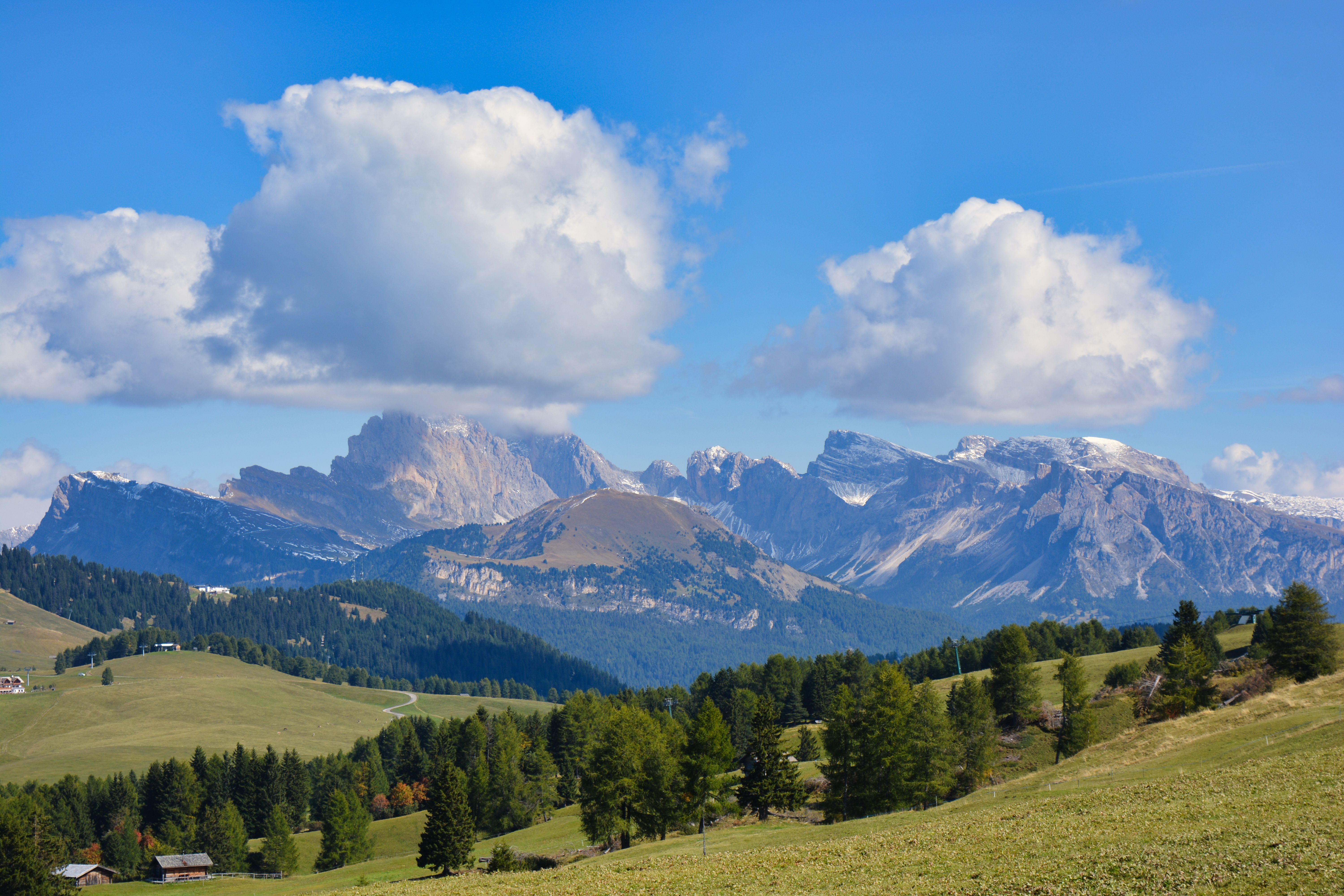 Meadow in Valley and Snowed Mountains · Free Stock Photo
