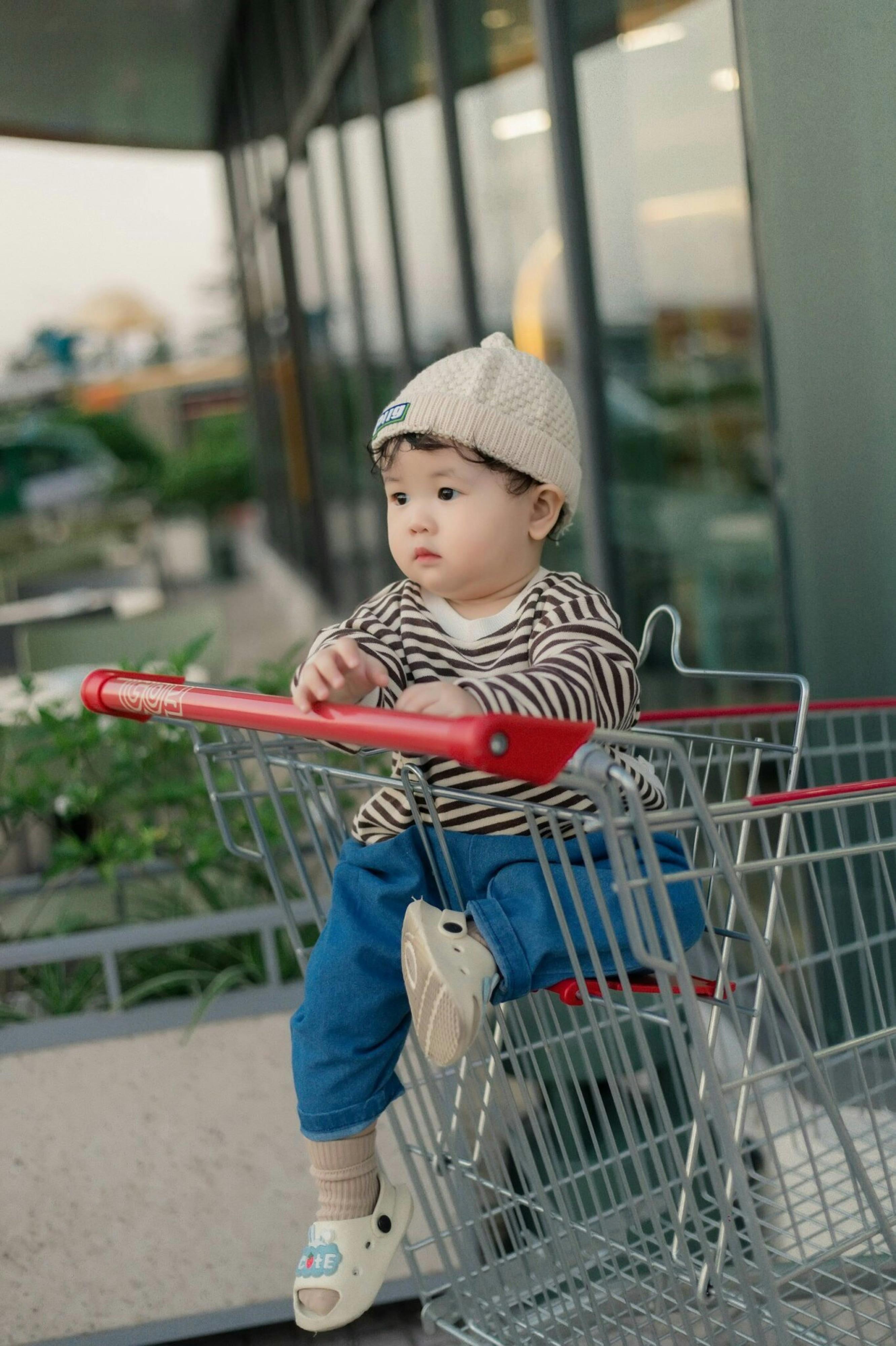 Monochrome Photo Of Child Wearing Knit Sweater · Free Stock Photo