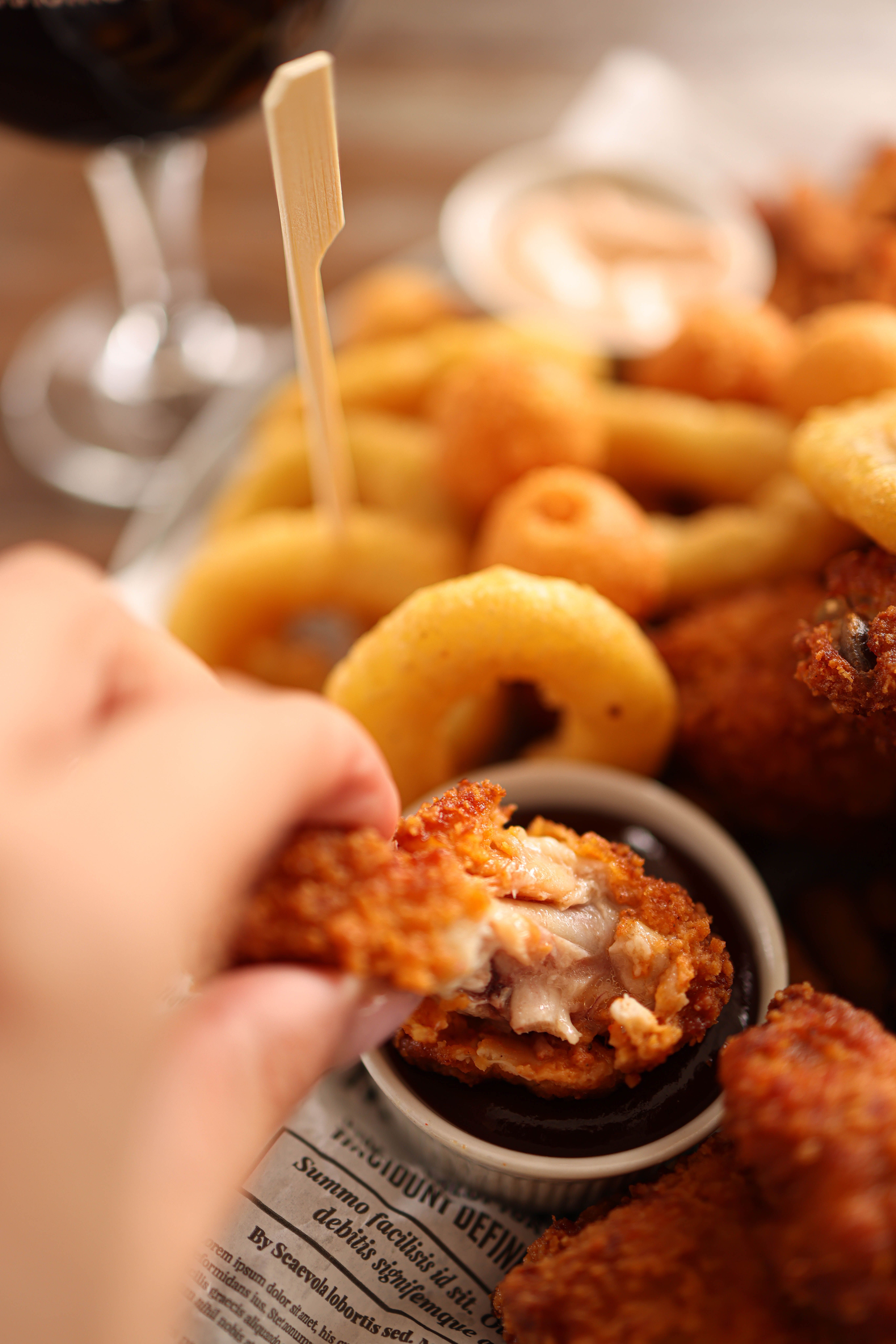 Fried Chicke Wing in Hand · Free Stock Photo