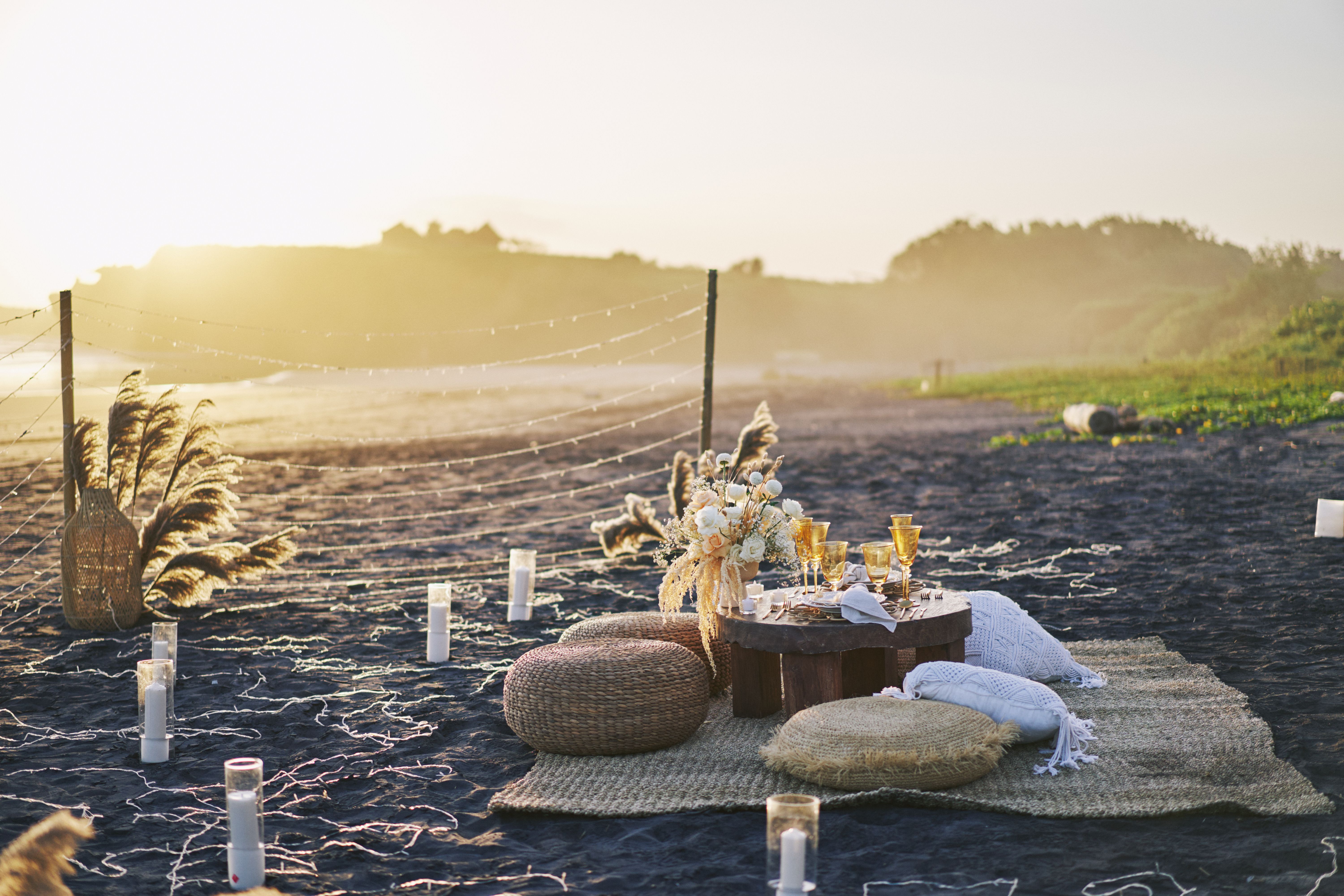 Table and Decorations on Beach at Sunset · Free Stock Photo