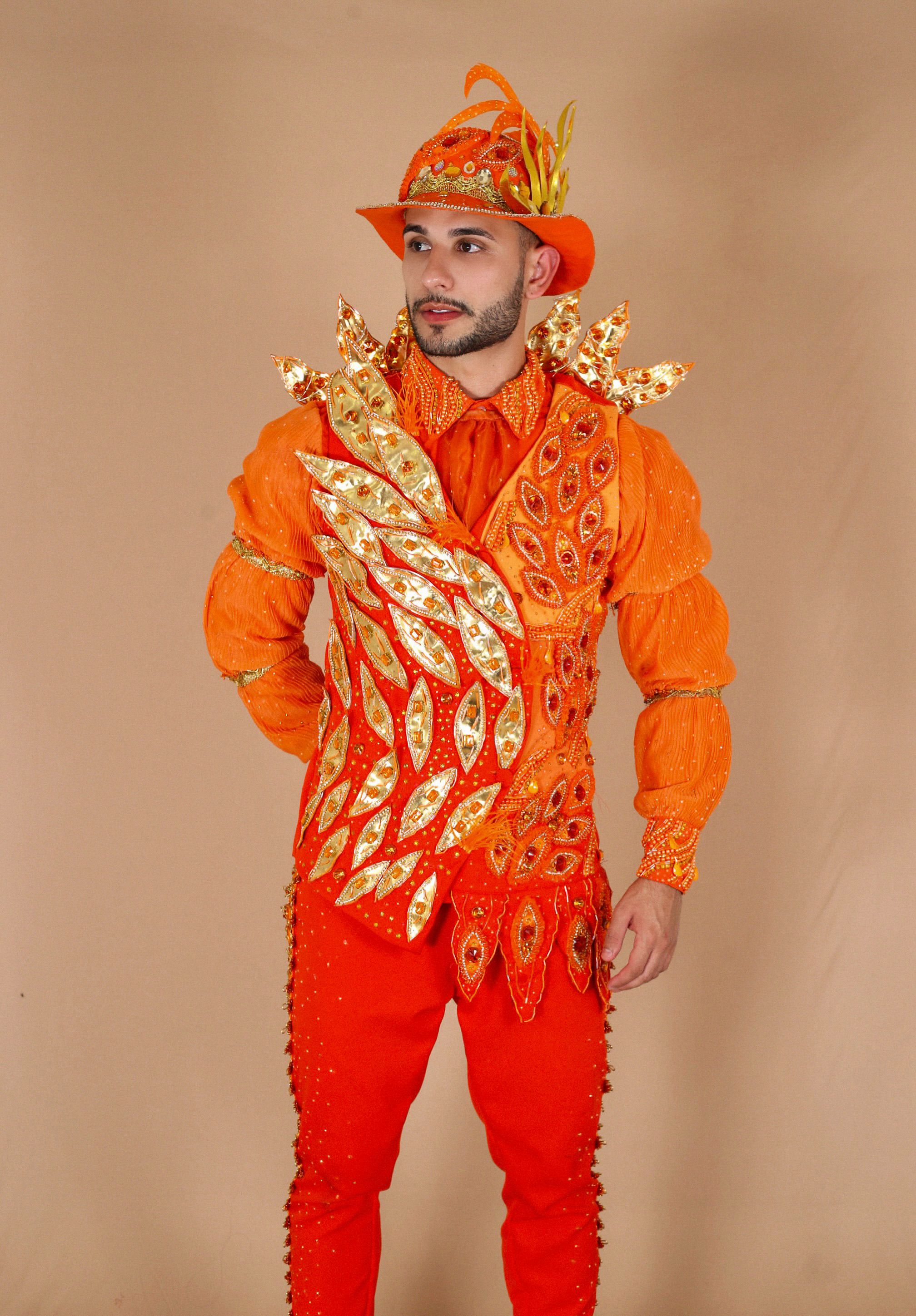 Portrait of Man in Orange Costume · Free Stock Photo