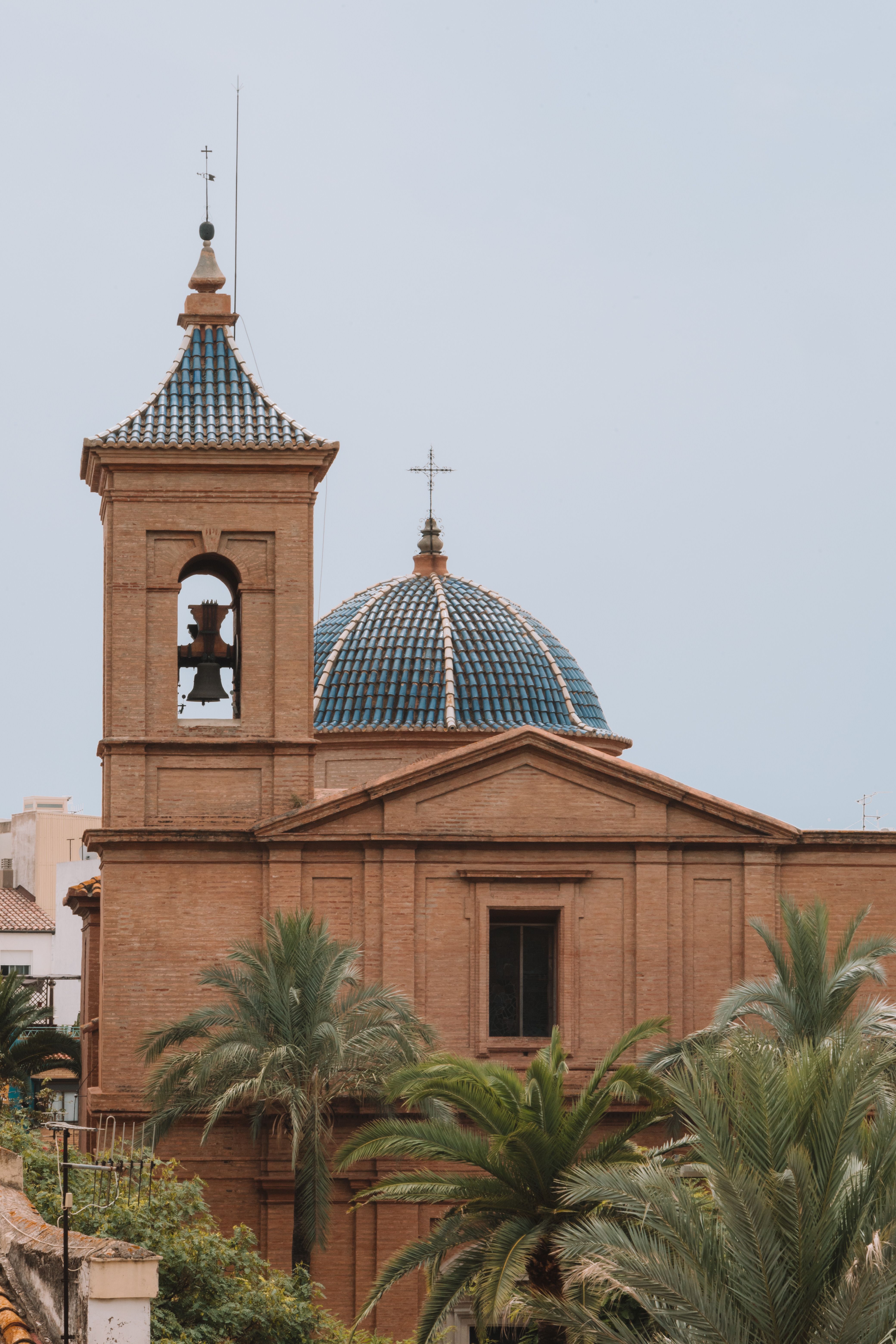 View of a Church and Palm Trees · Free Stock Photo