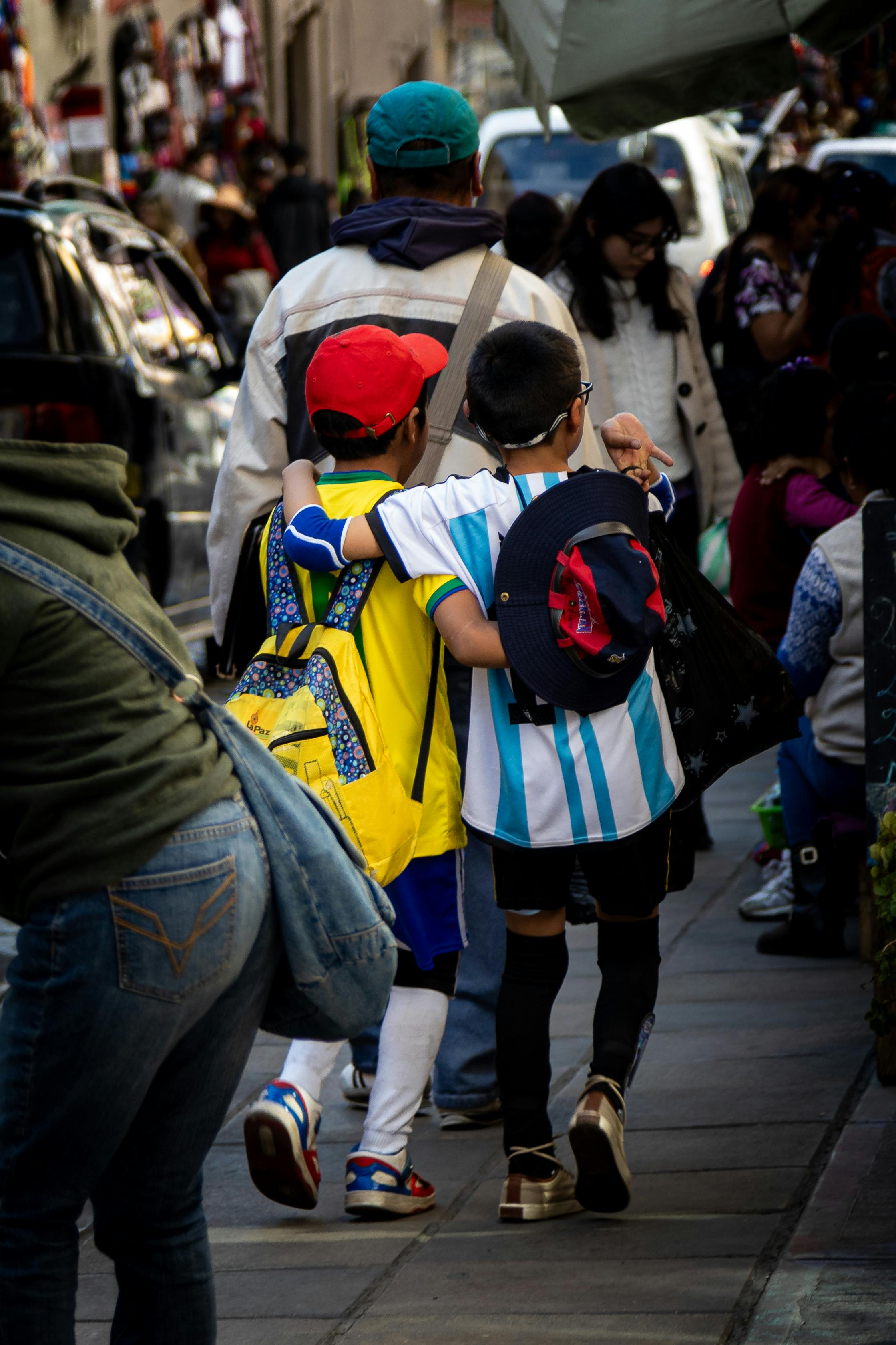 Back View of a Silhouetted Crowd at Sunset · Free Stock Photo