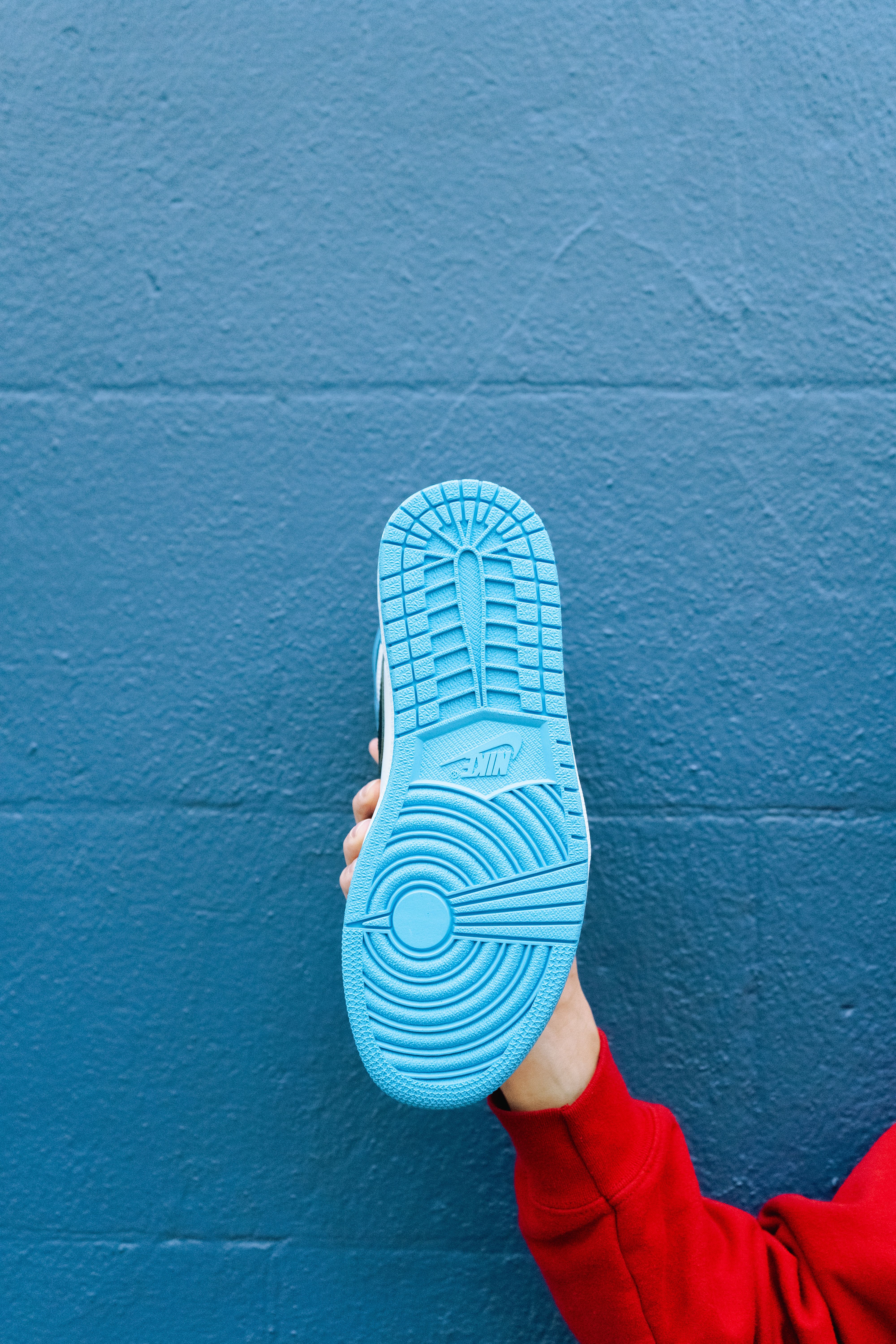 Hand Holding Shoe · Free Stock Photo