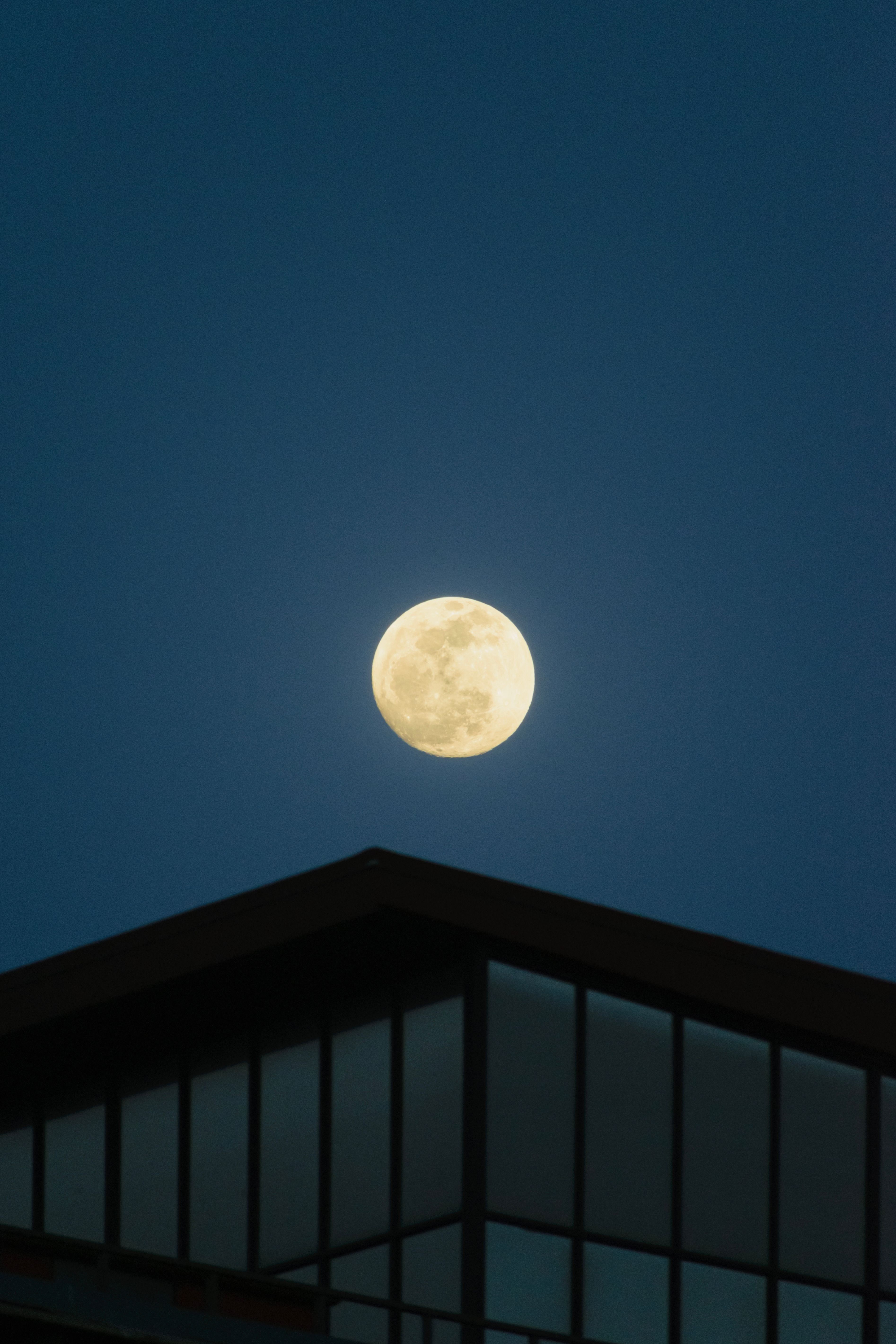 Full Moon over Roof · Free Stock Photo