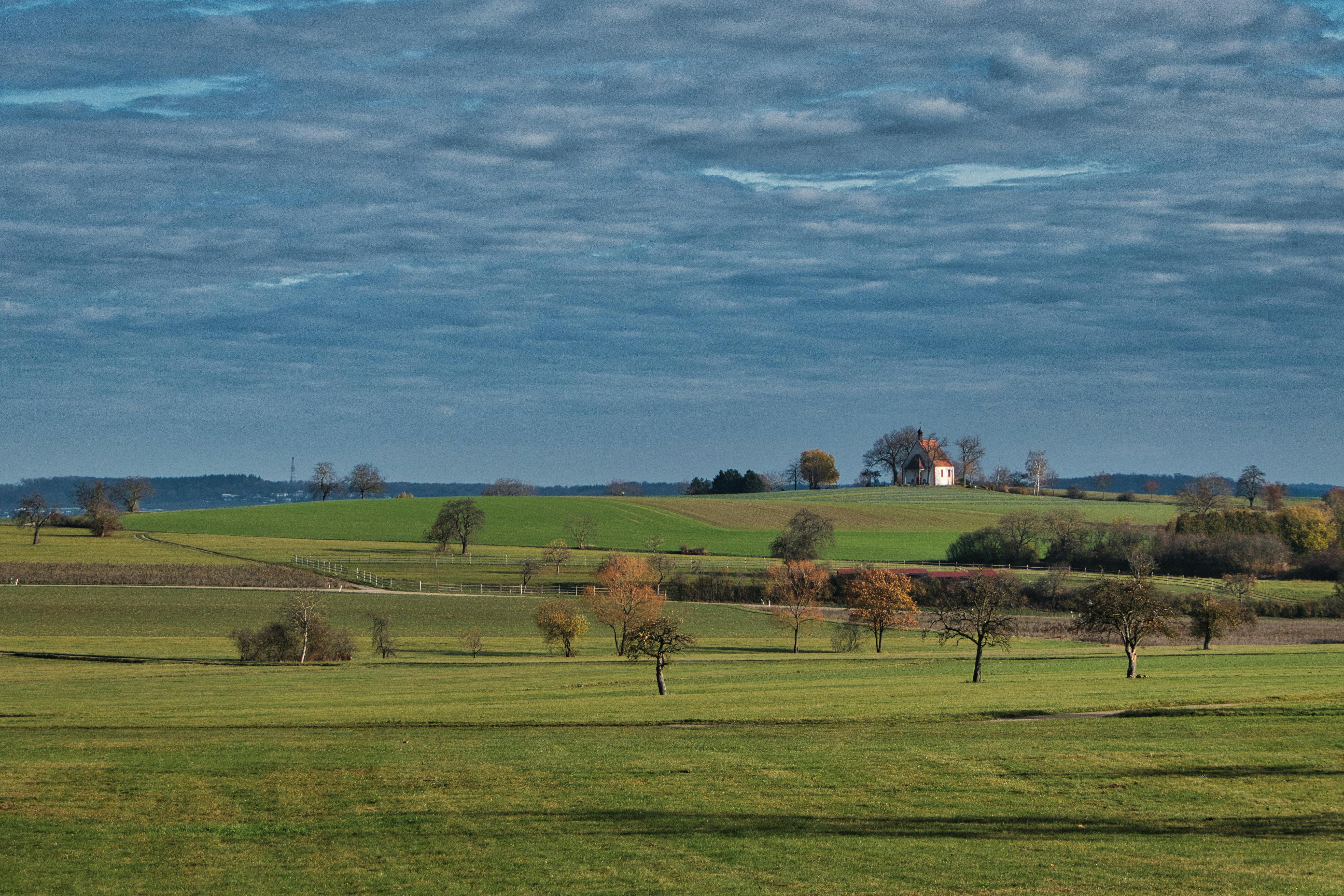 Landscape with Church on Hill · Free Stock Photo