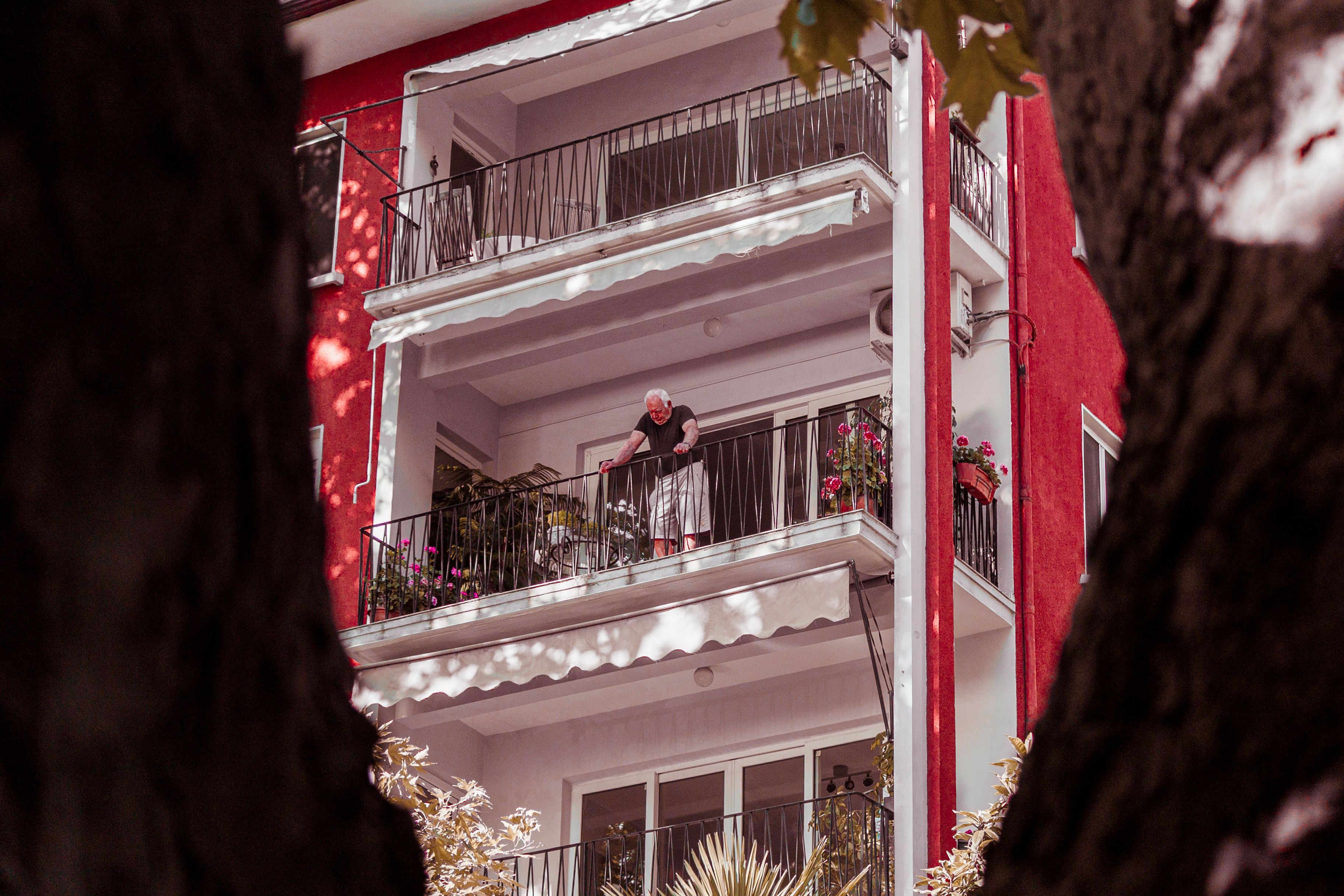 Man on Balcony · Free Stock Photo