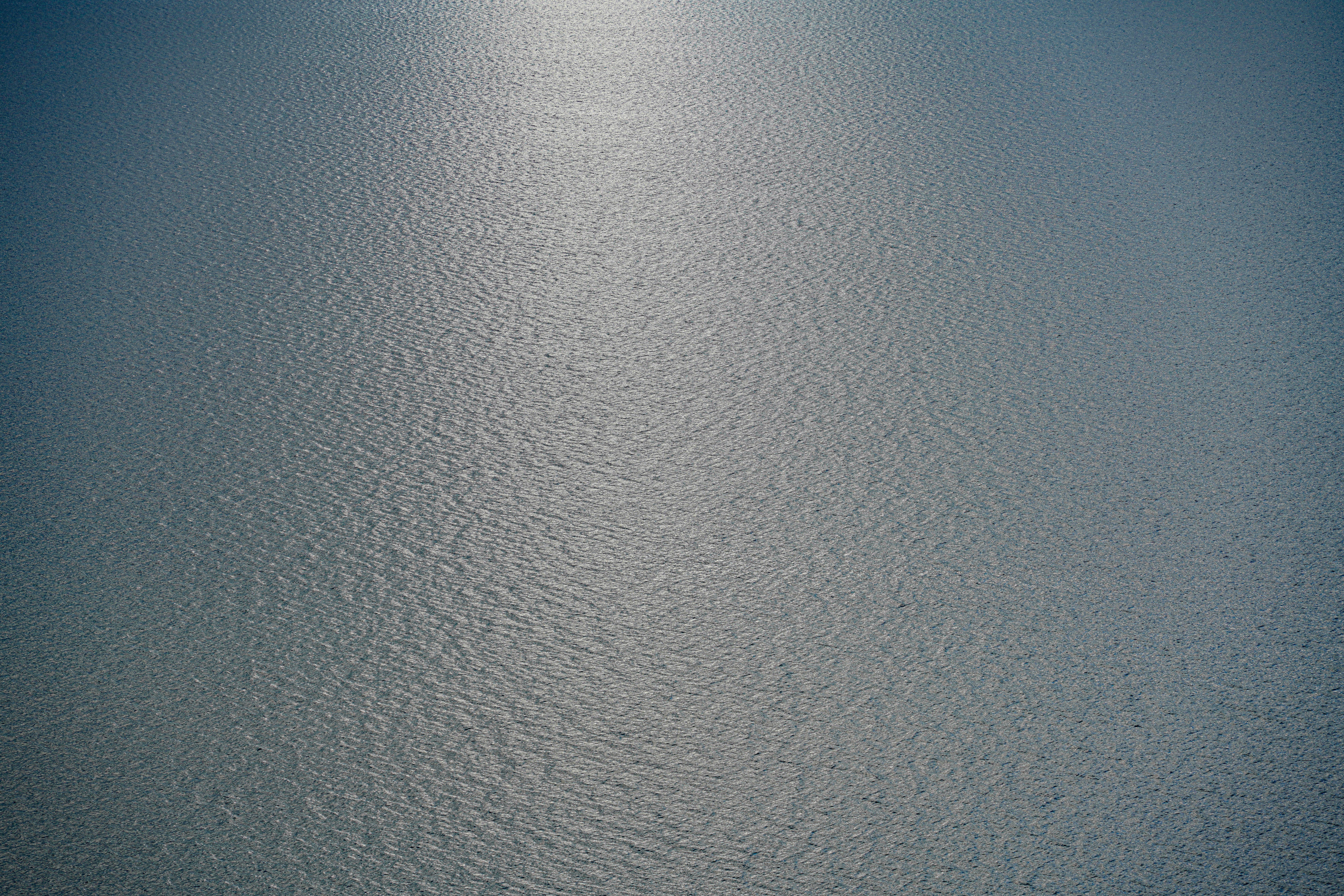 Wrinkled Sea Surface and Reflection of Sun · Free Stock Photo