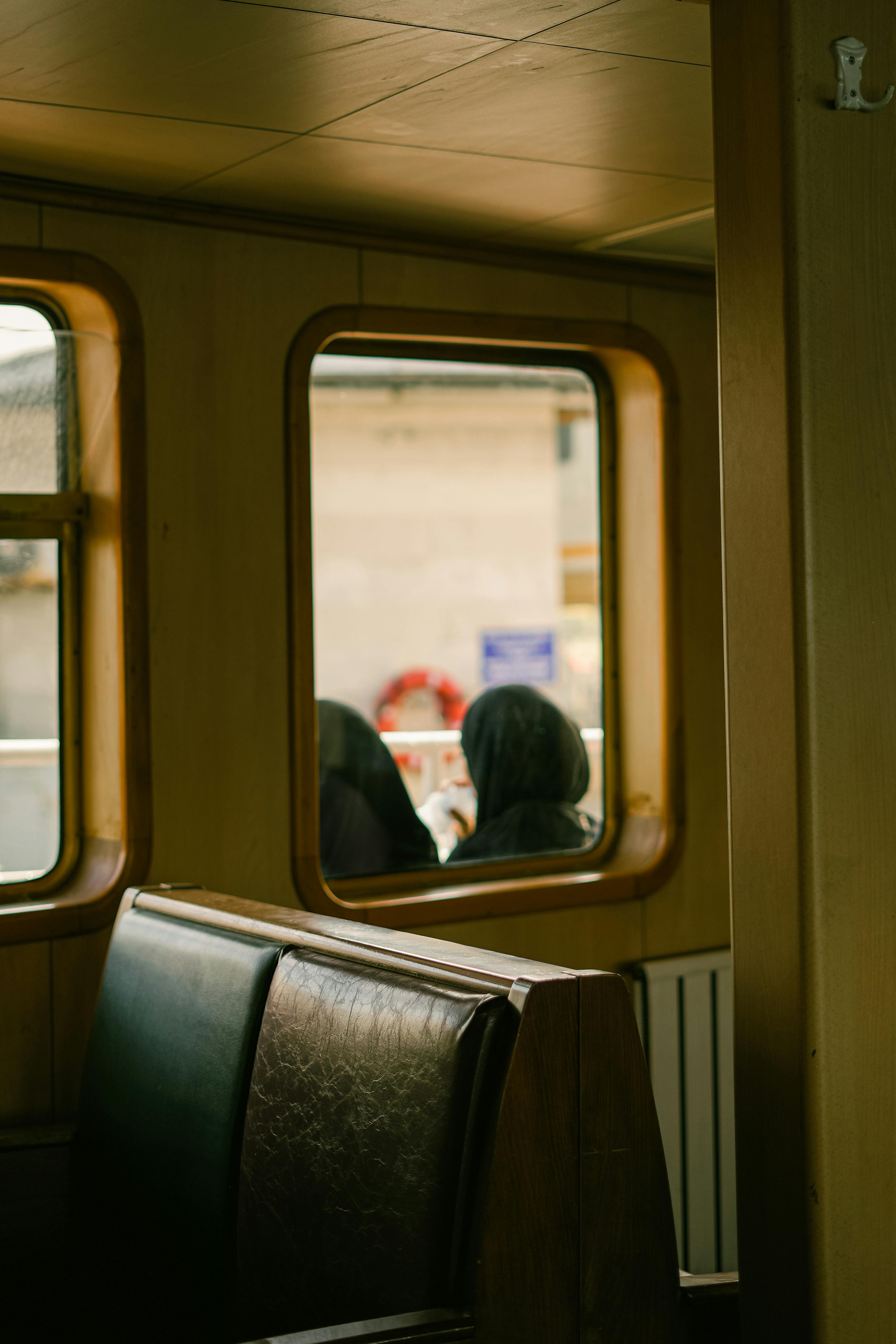 Seats and Windows of a Ferry · Free Stock Photo