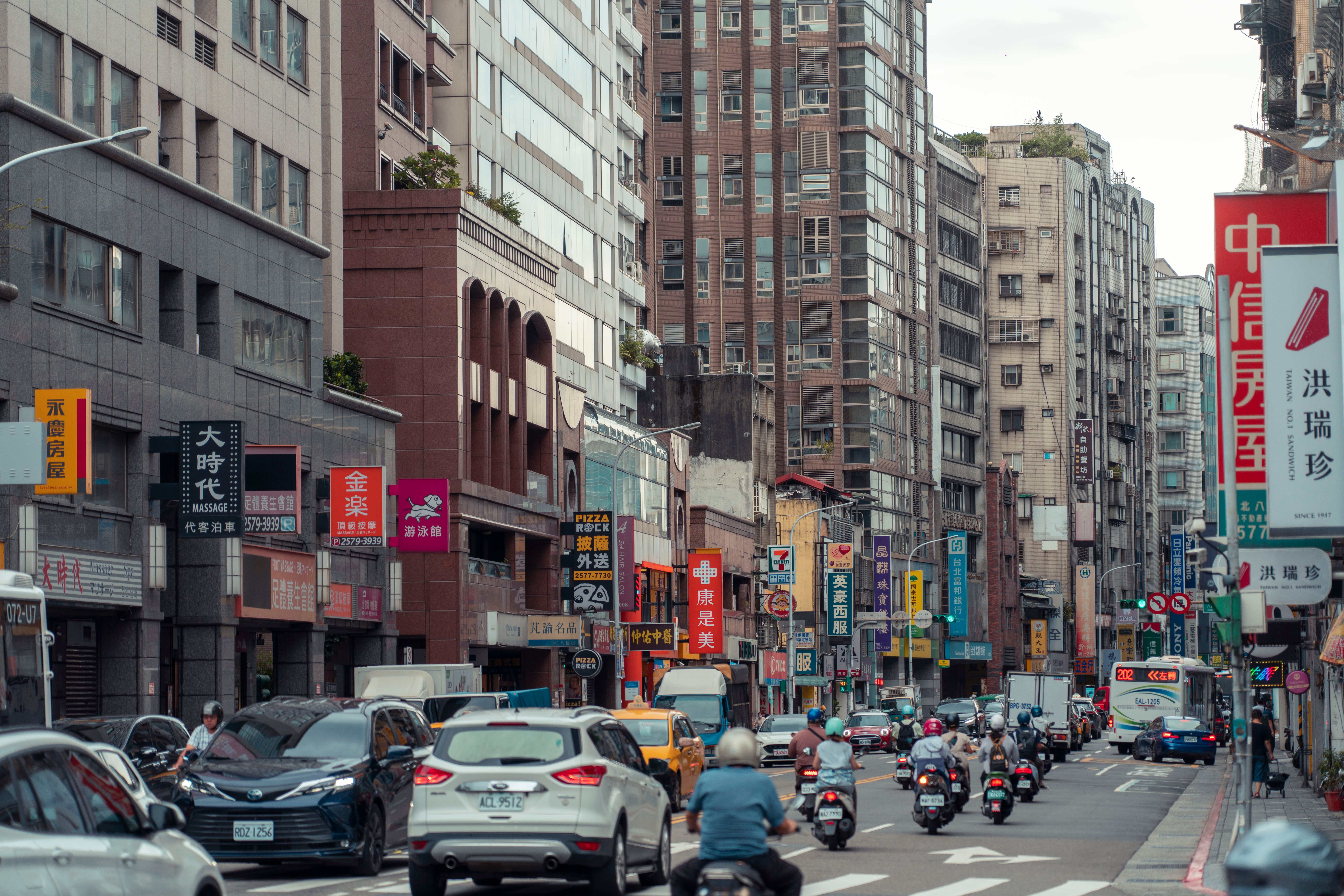 Traffic on City Street at Day · Free Stock Photo