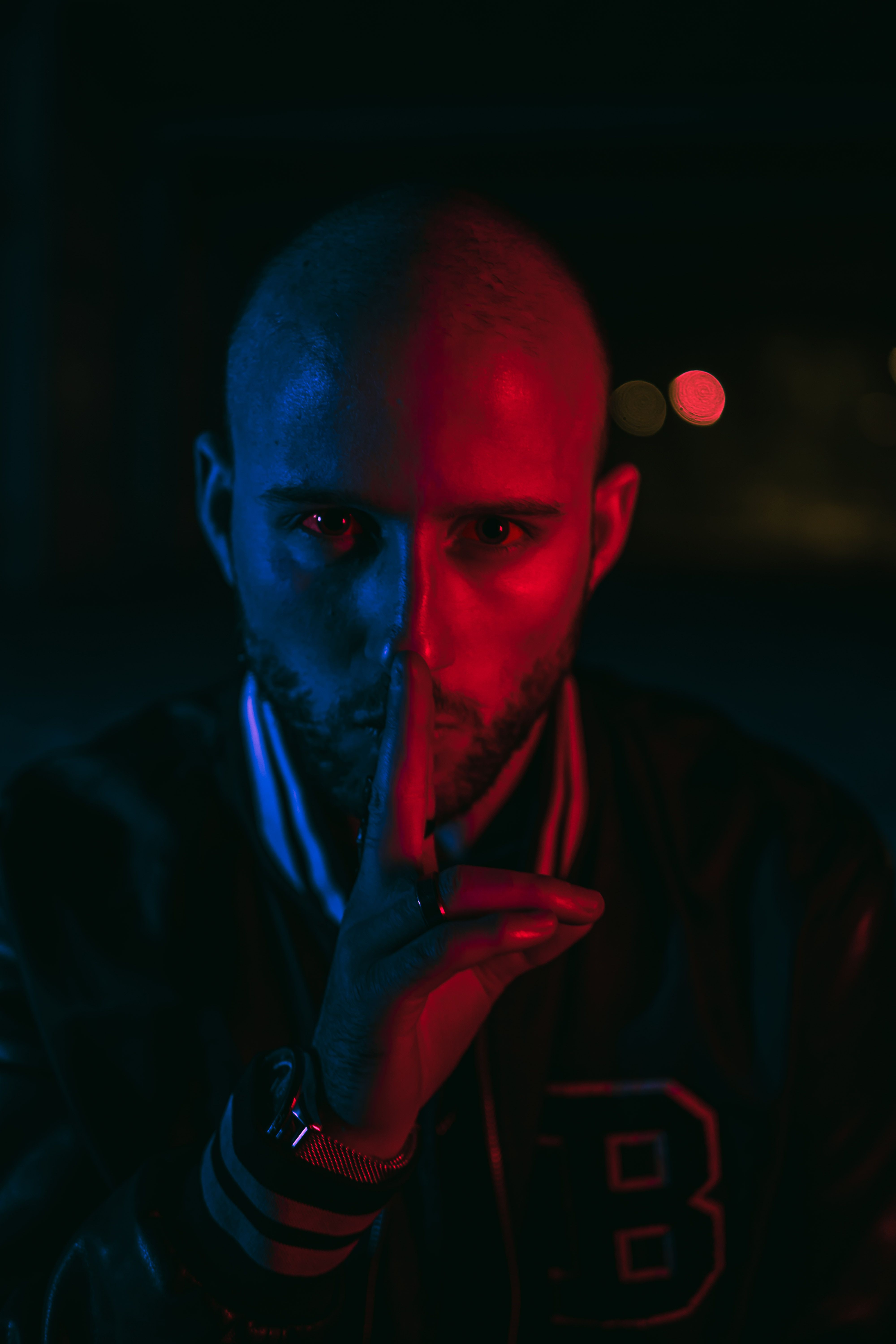 Dramatic Portrait in Blue and Red Lighting · Free Stock Photo