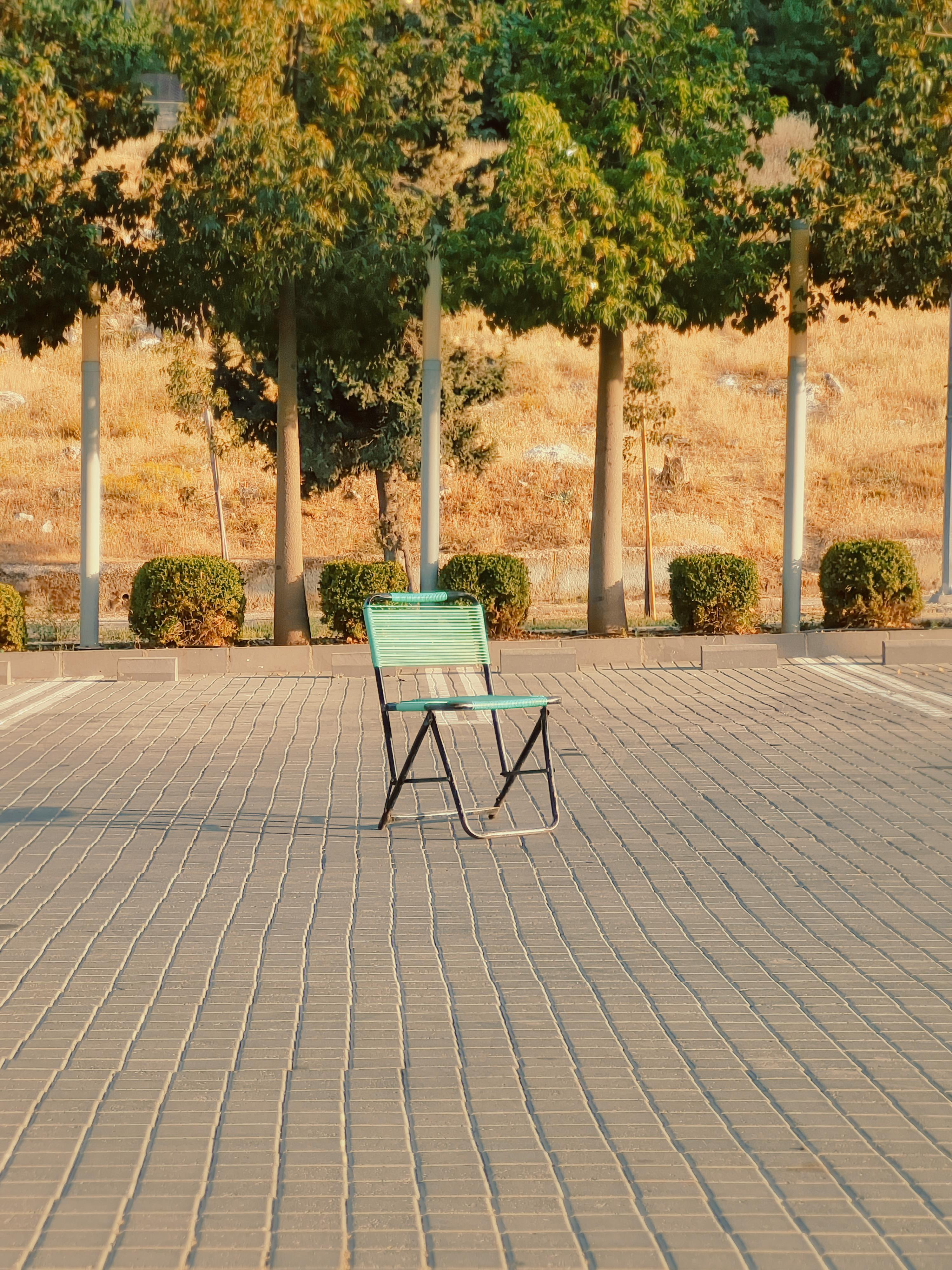 Chair on a Pavement · Free Stock Photo