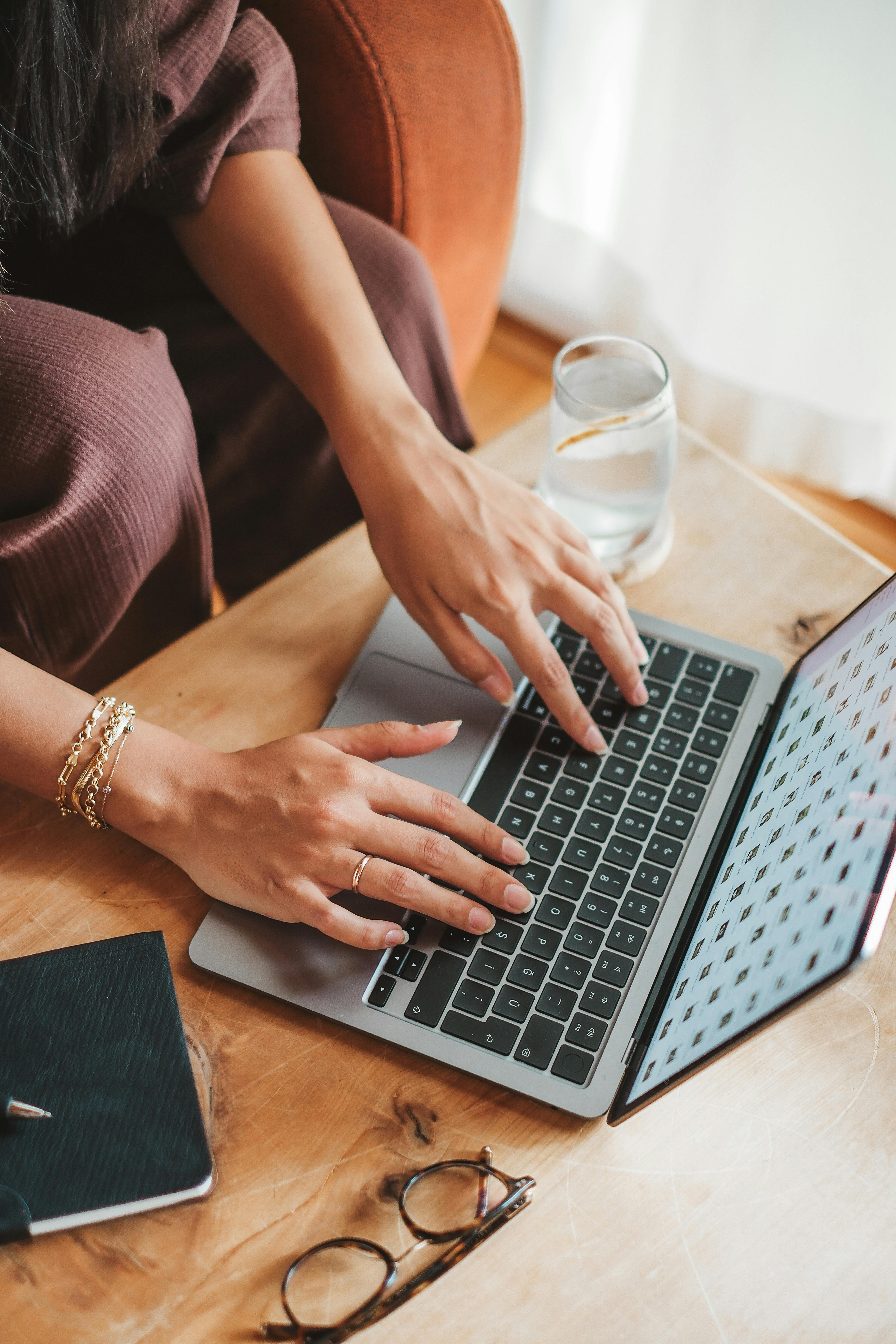 Woman Hands Typing on Laptop · Free Stock Photo