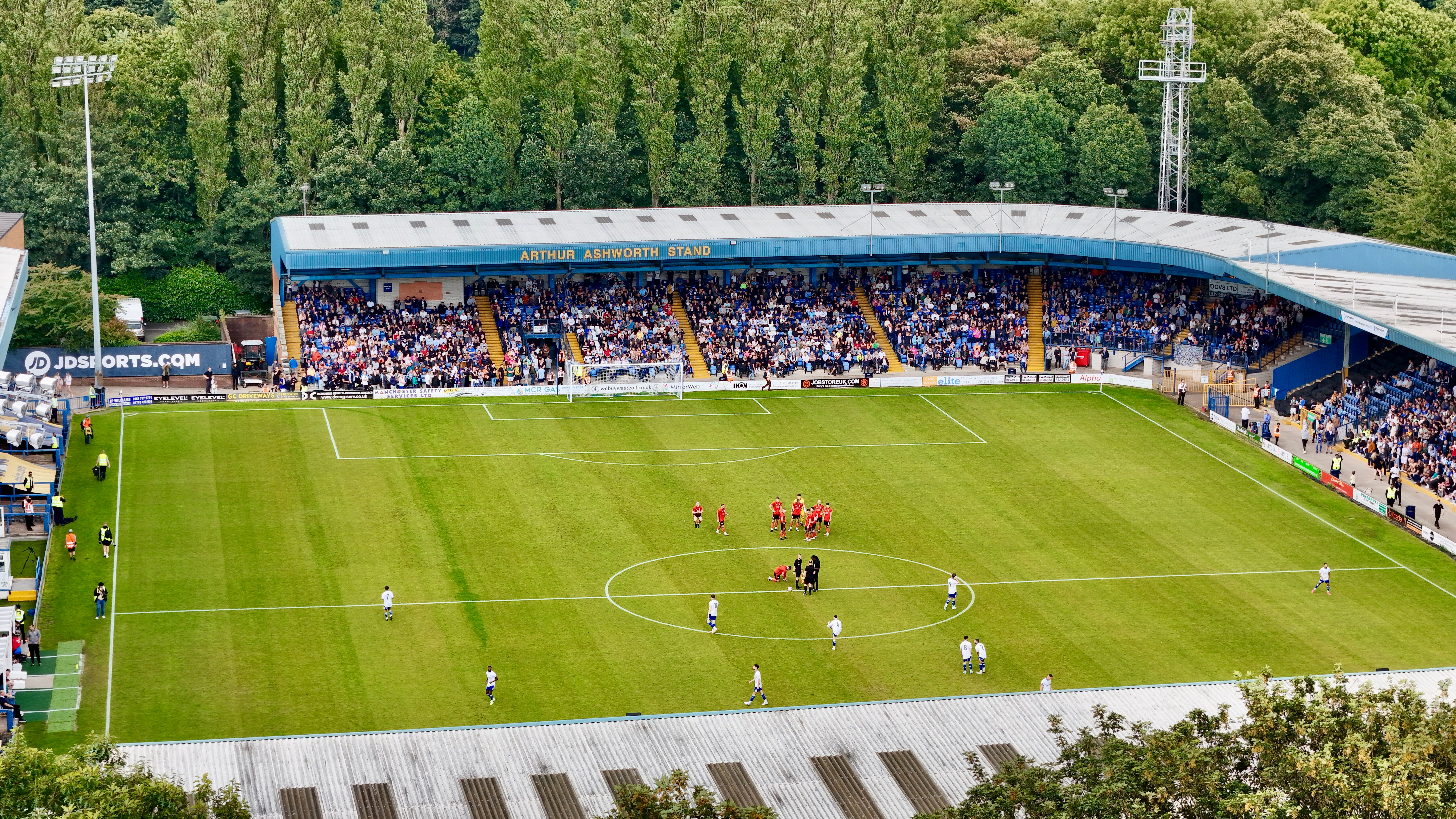 Men Playing Football on a Stadium · Free Stock Photo