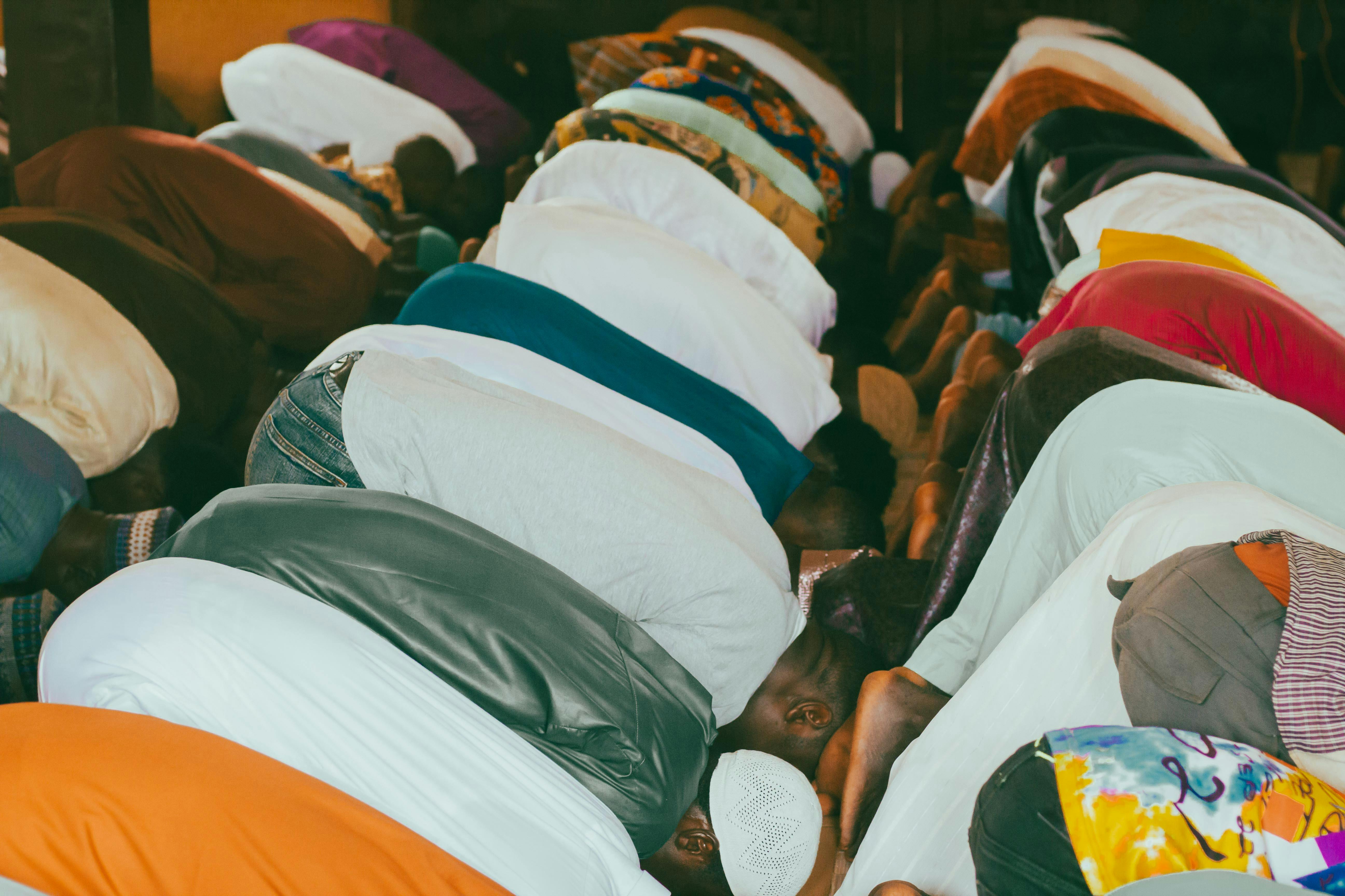 Men Praying Towards Mecca in a Mosque · Free Stock Photo
