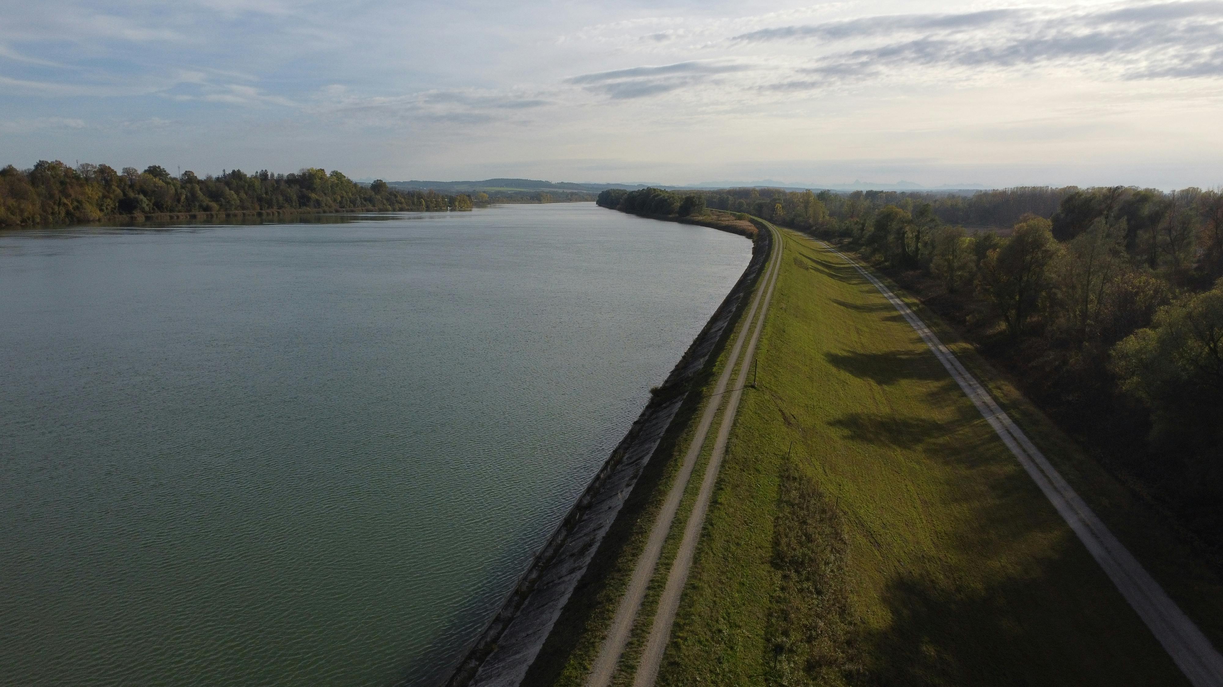 Aerial View of a Large River, Road and Trees · Free Stock Photo