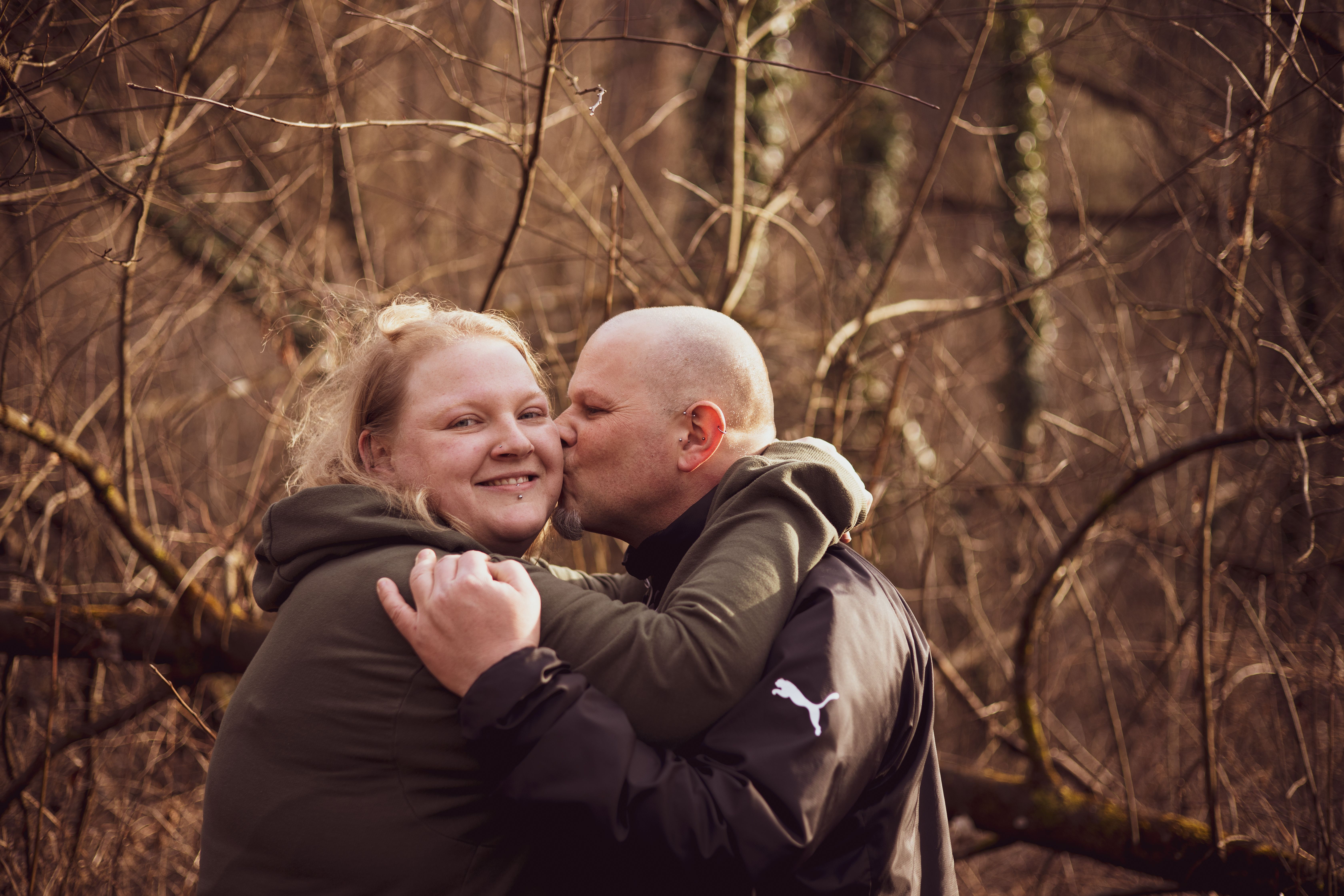 Couple Embracing and Kissing · Free Stock Photo