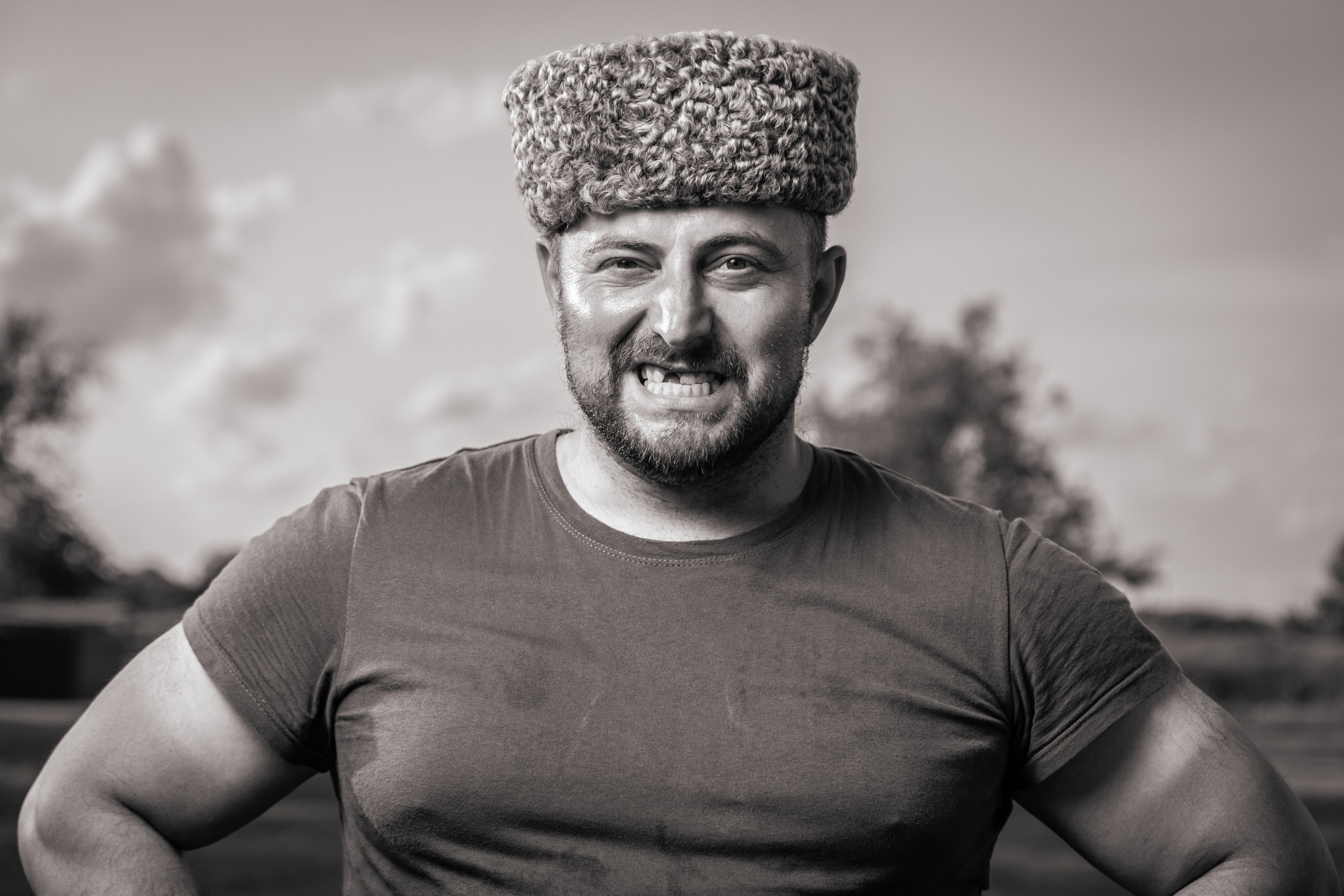 Man Without Single Teeth in Astrakhan Hat · Free Stock Photo