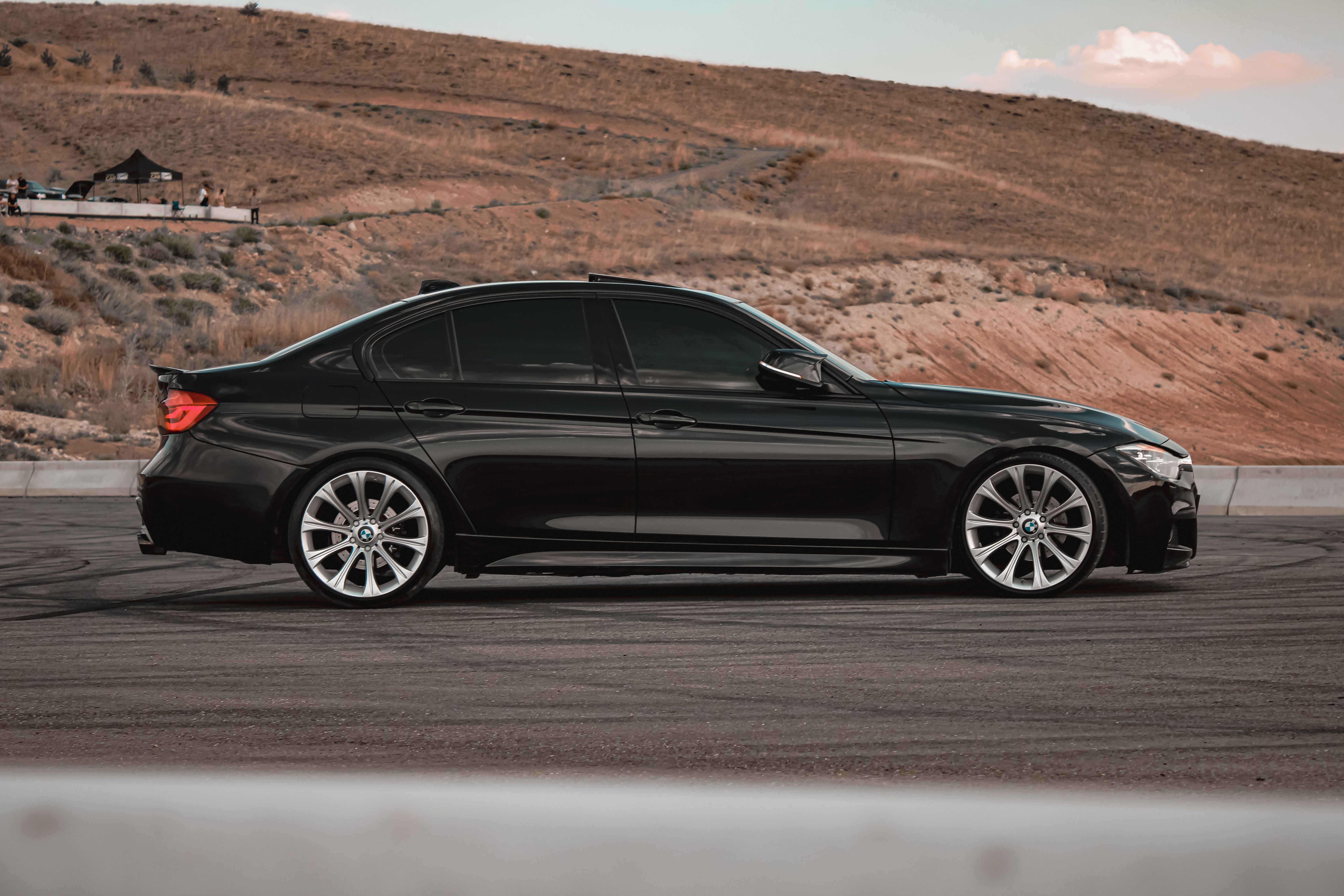 View of a Black BMW F30 with Tinted Windows · Free Stock Photo