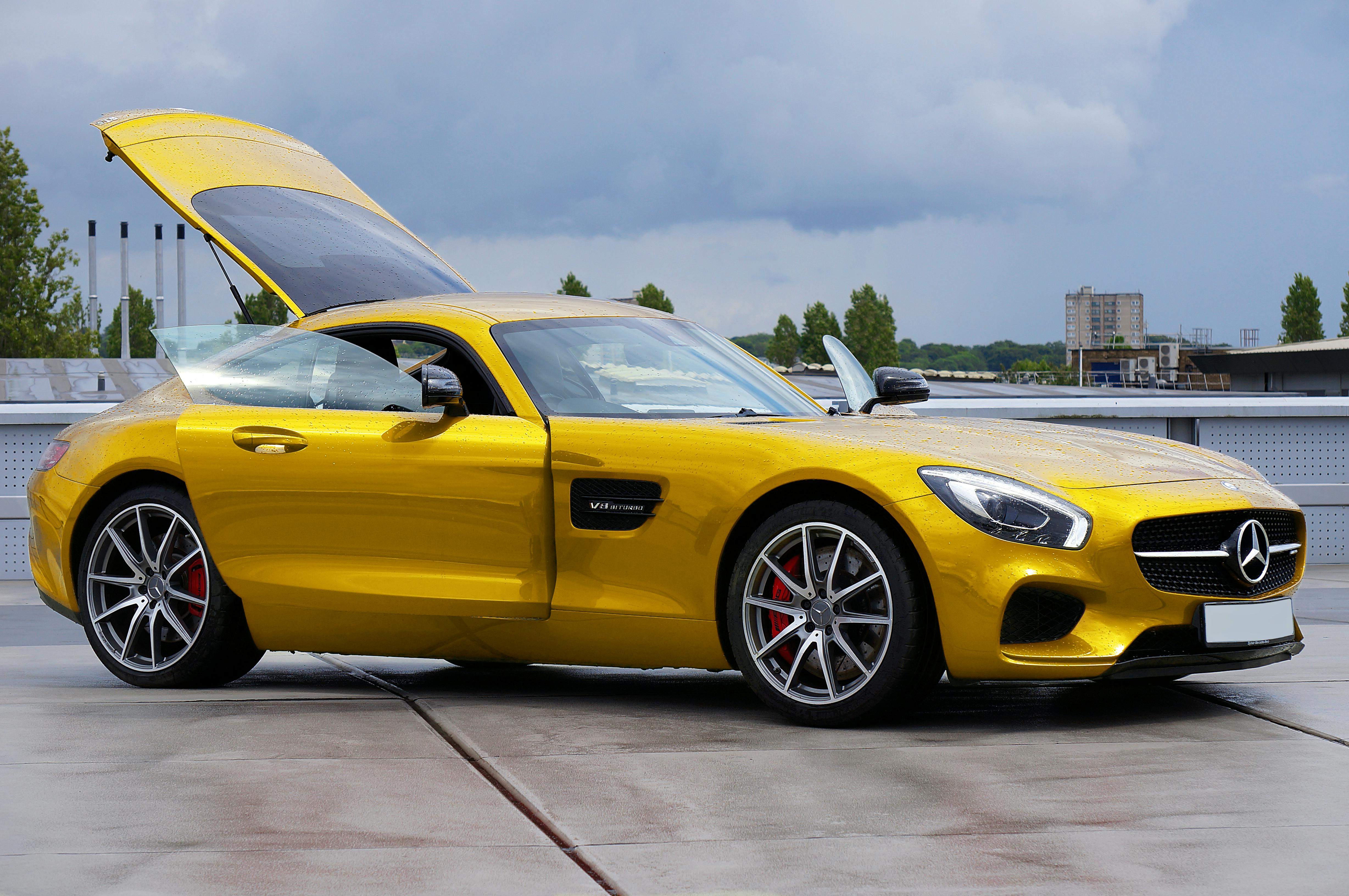 Yellow Mercedes on a Parking Lot · Free Stock Photo