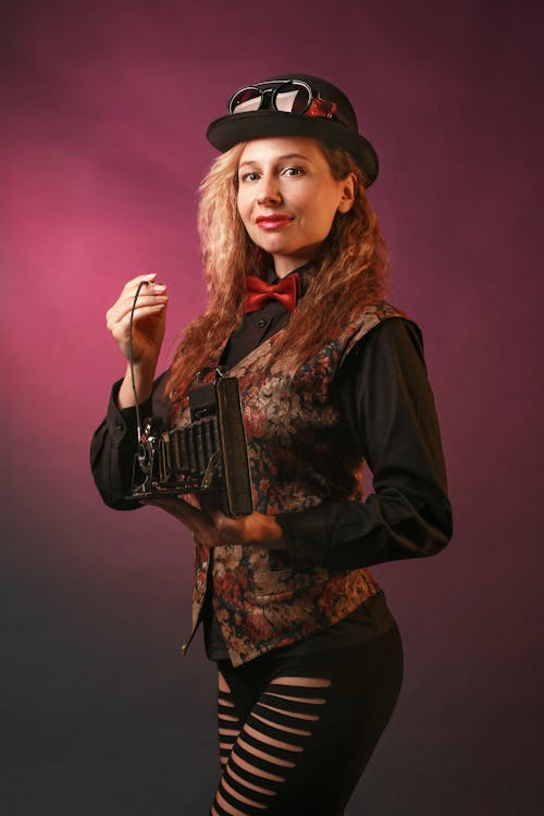 Woman Holding Old Camera · Free Stock Photo Woman Holding Old Camera · Free Stock Photo