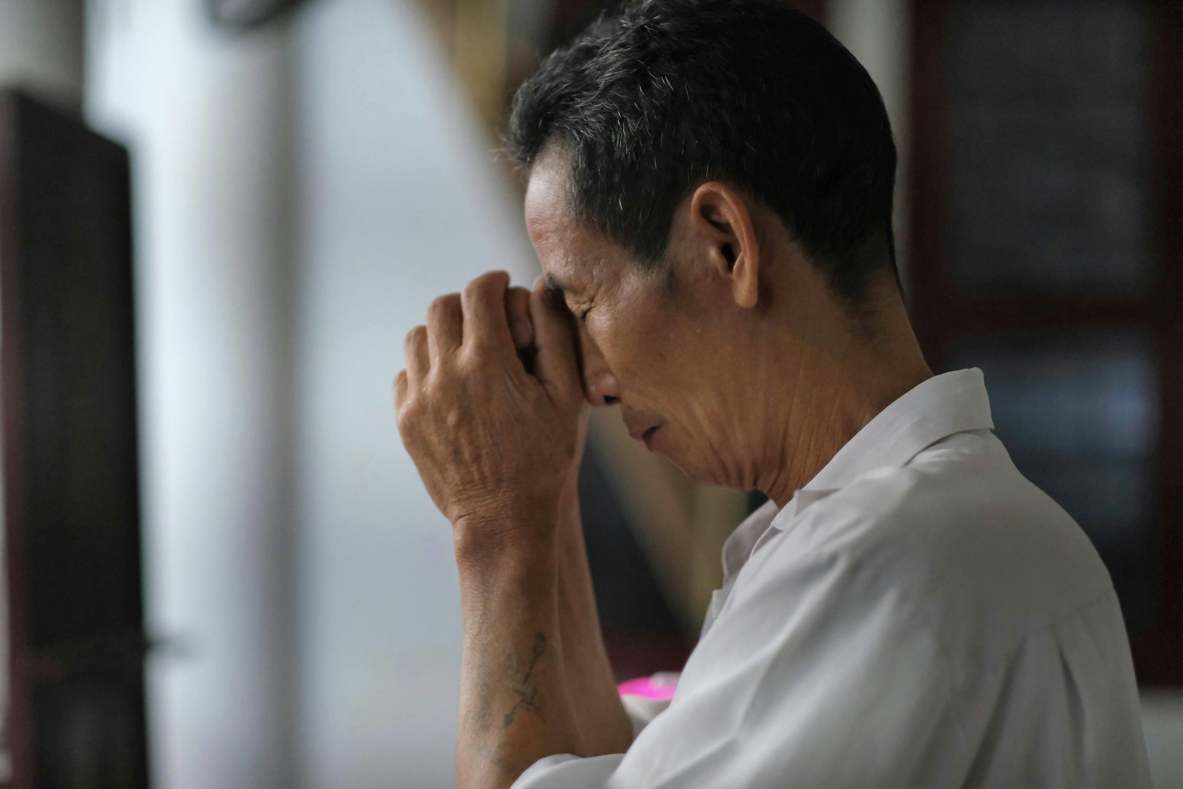 Men Praying Together · Free Stock Photo