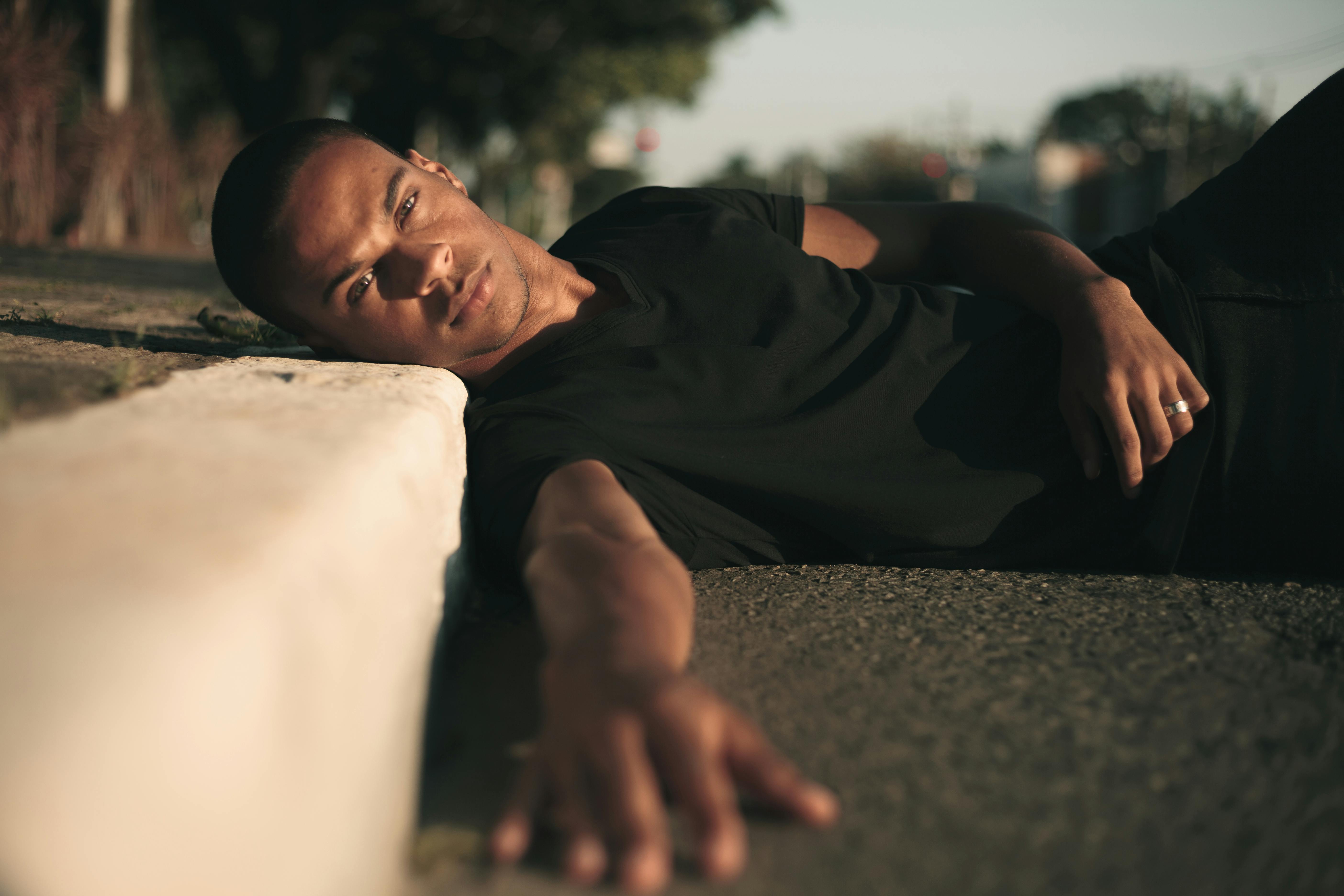 Man Laying On Road · Free Stock Photo