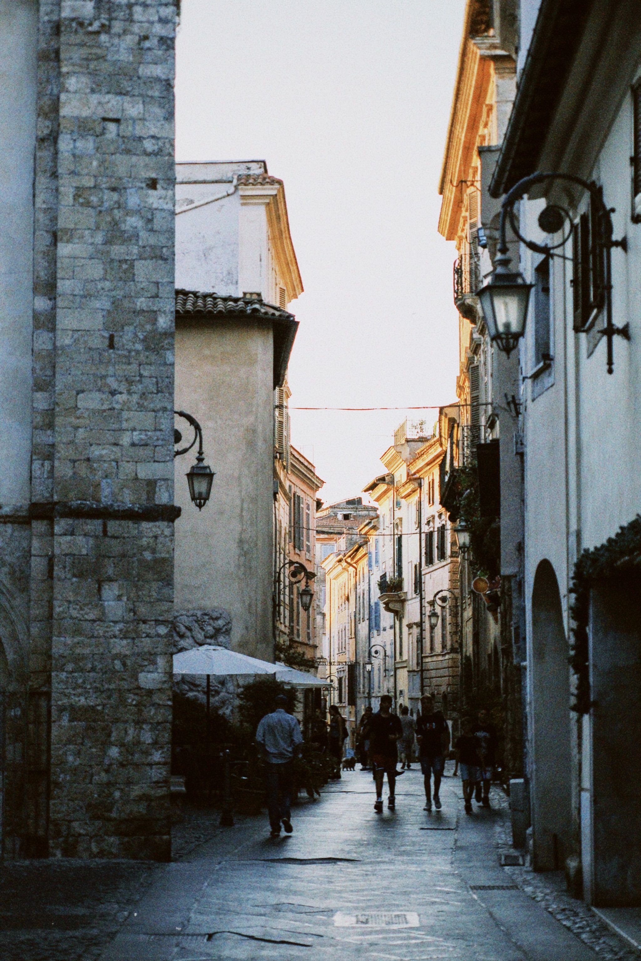 People Walking in Narrow Alley · Free Stock Photo