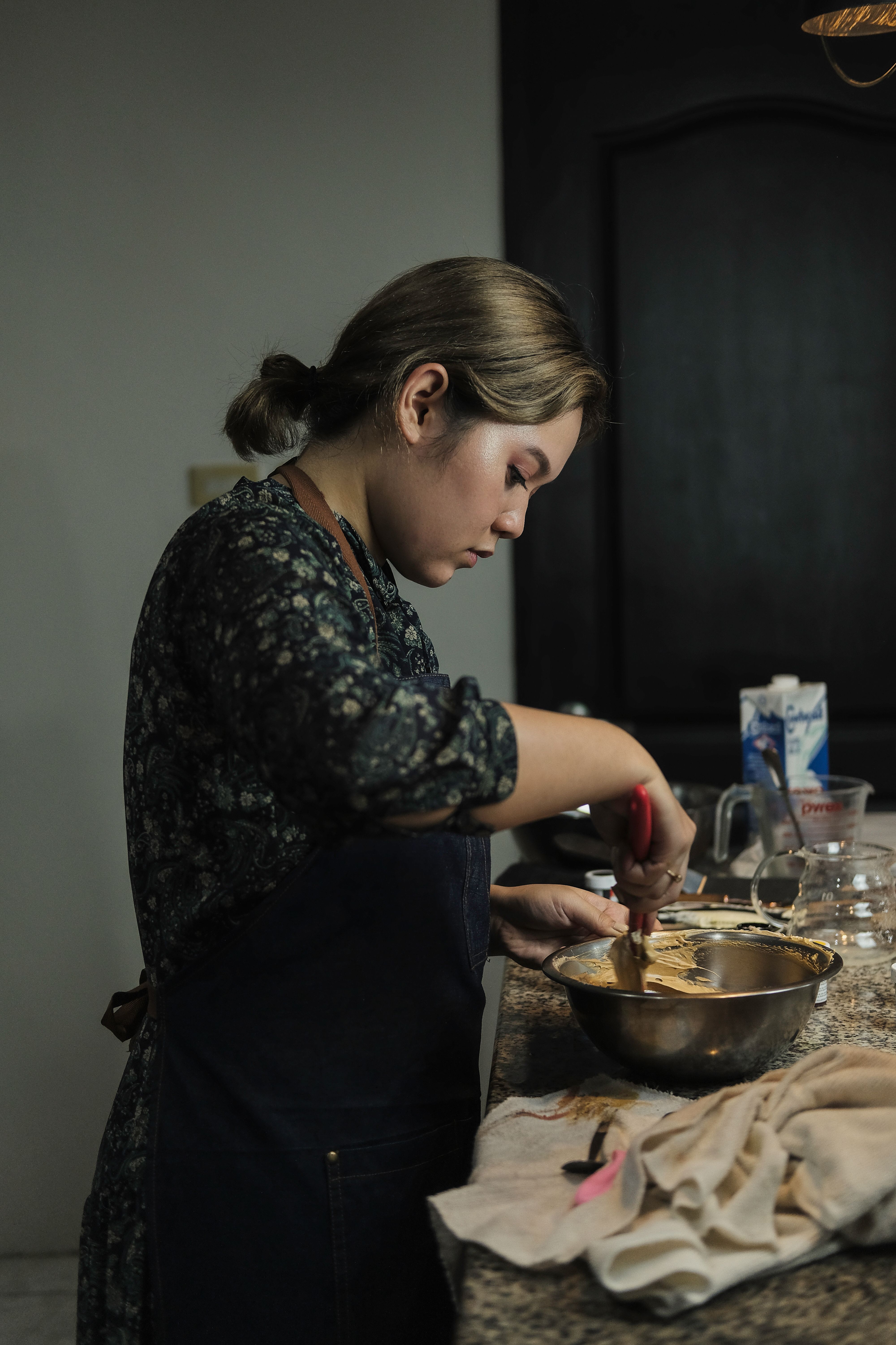 Woman Standing and Cooking · Free Stock Photo