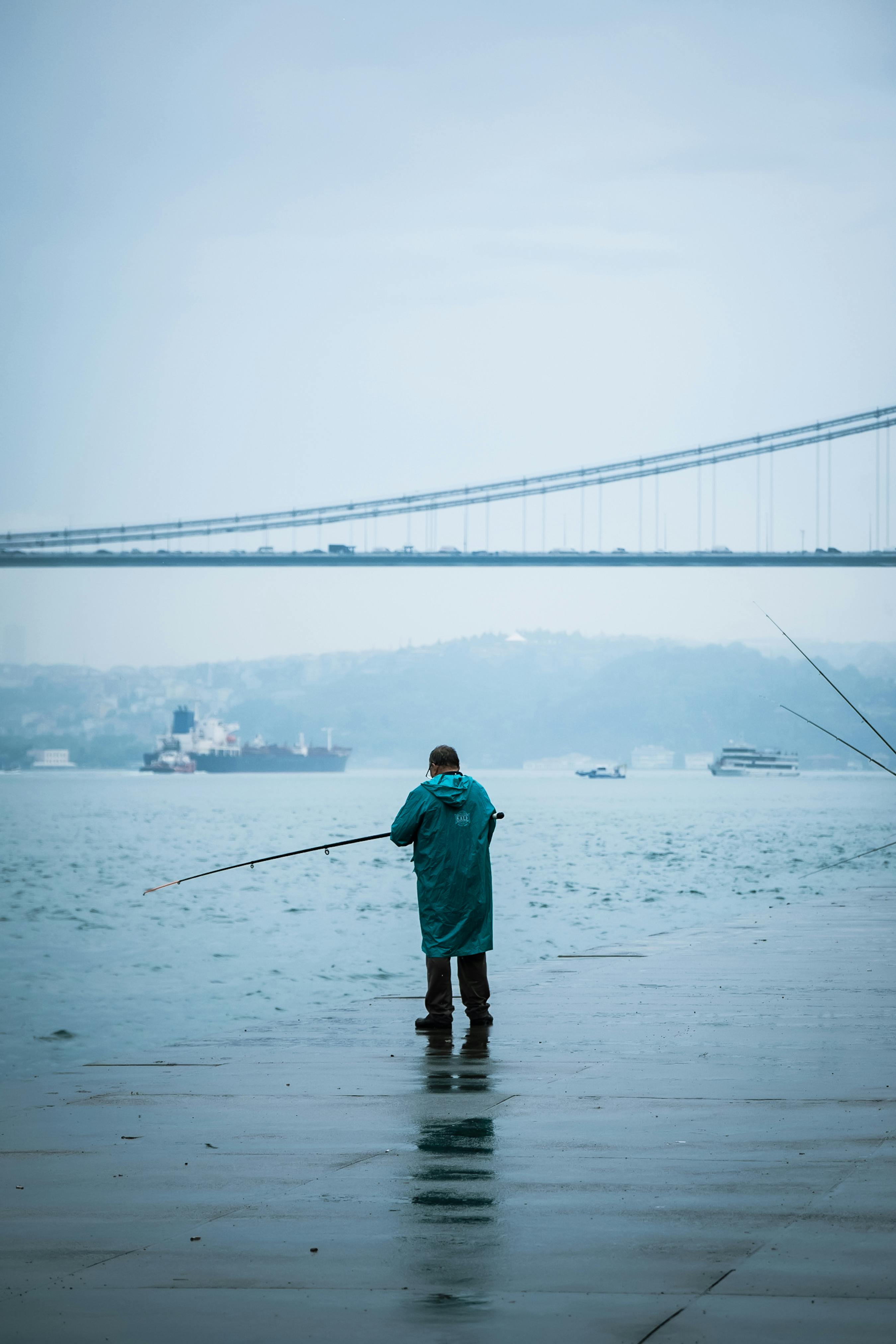Fishing Man Wearing Yellow Shirt · Free Stock Photo