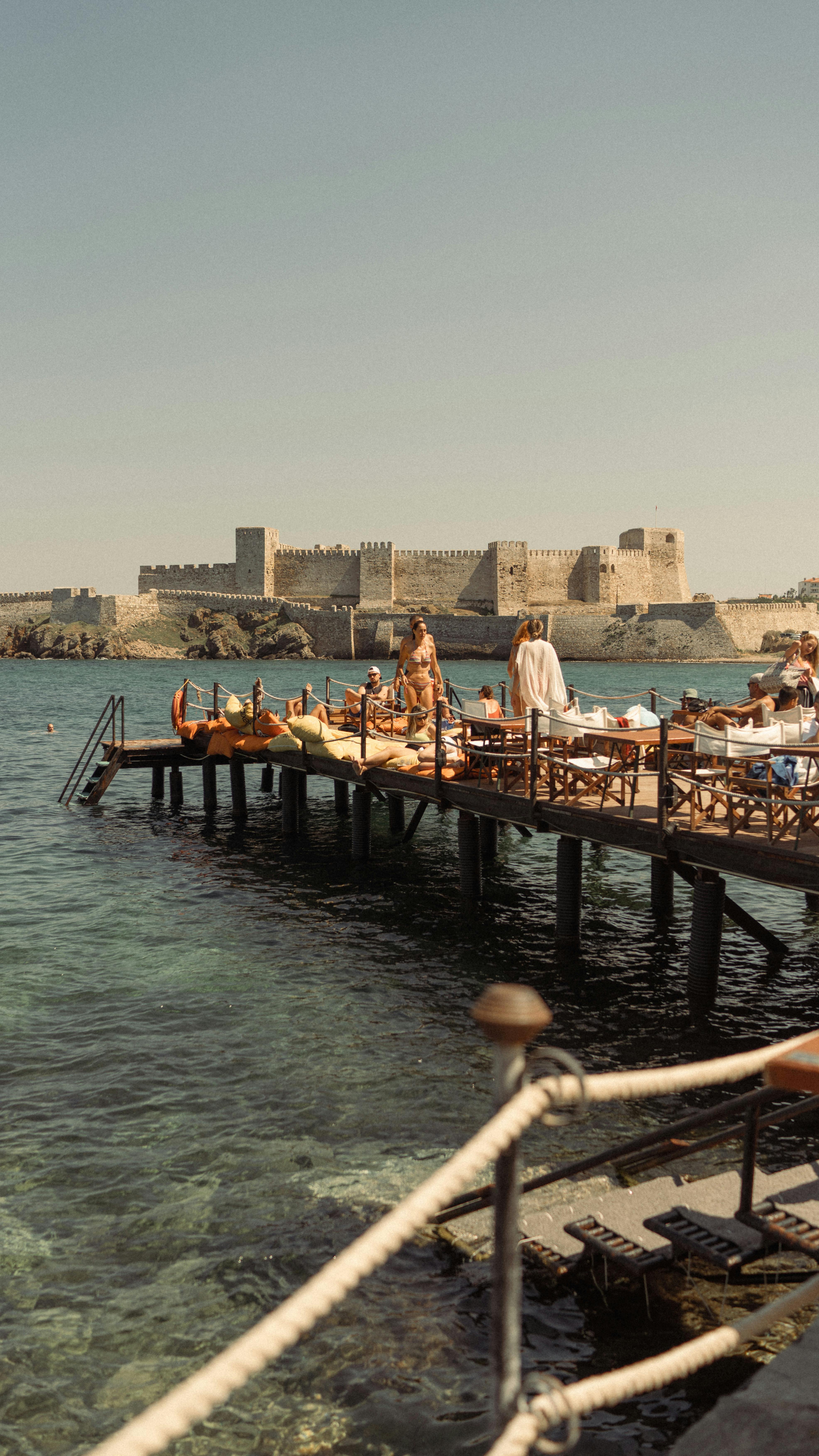 Jetty on River and Castle Wall · Free Stock Photo