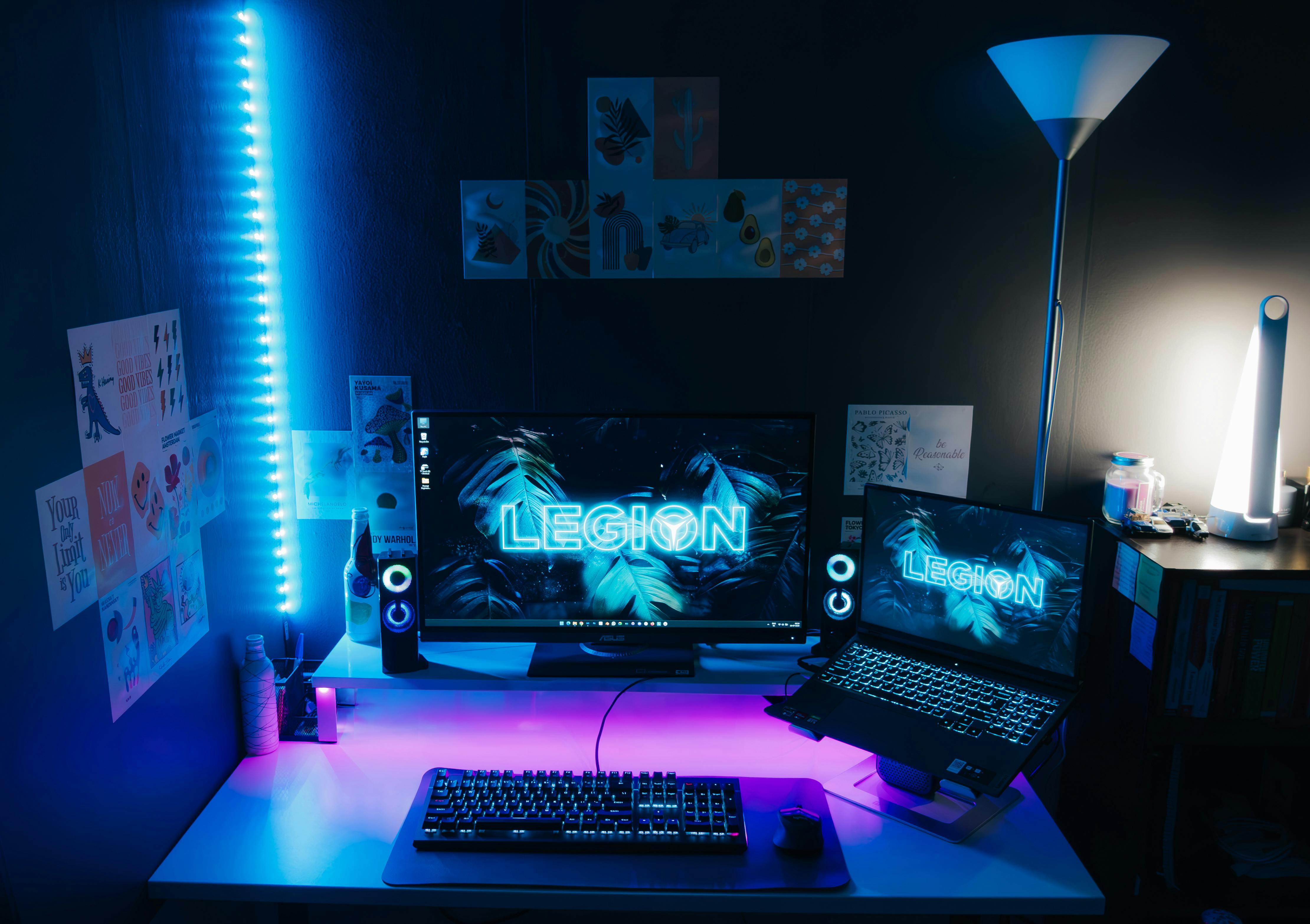 View of a Computer and Laptop Standing in a Desk in Blue LED Lighting ...