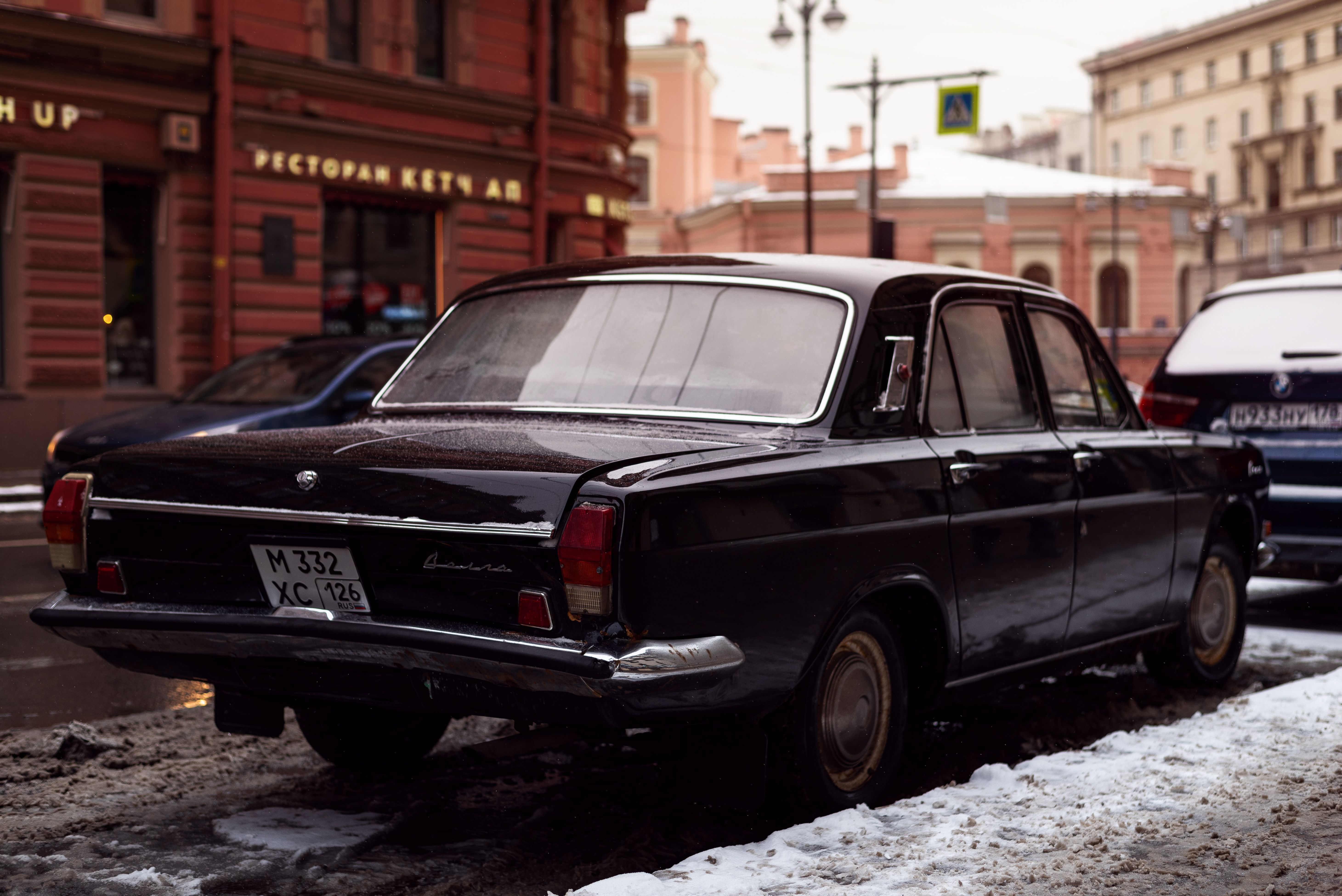 Vintage Black Volga GAZ-24 Car Parked on a City Street · Free Stock Photo