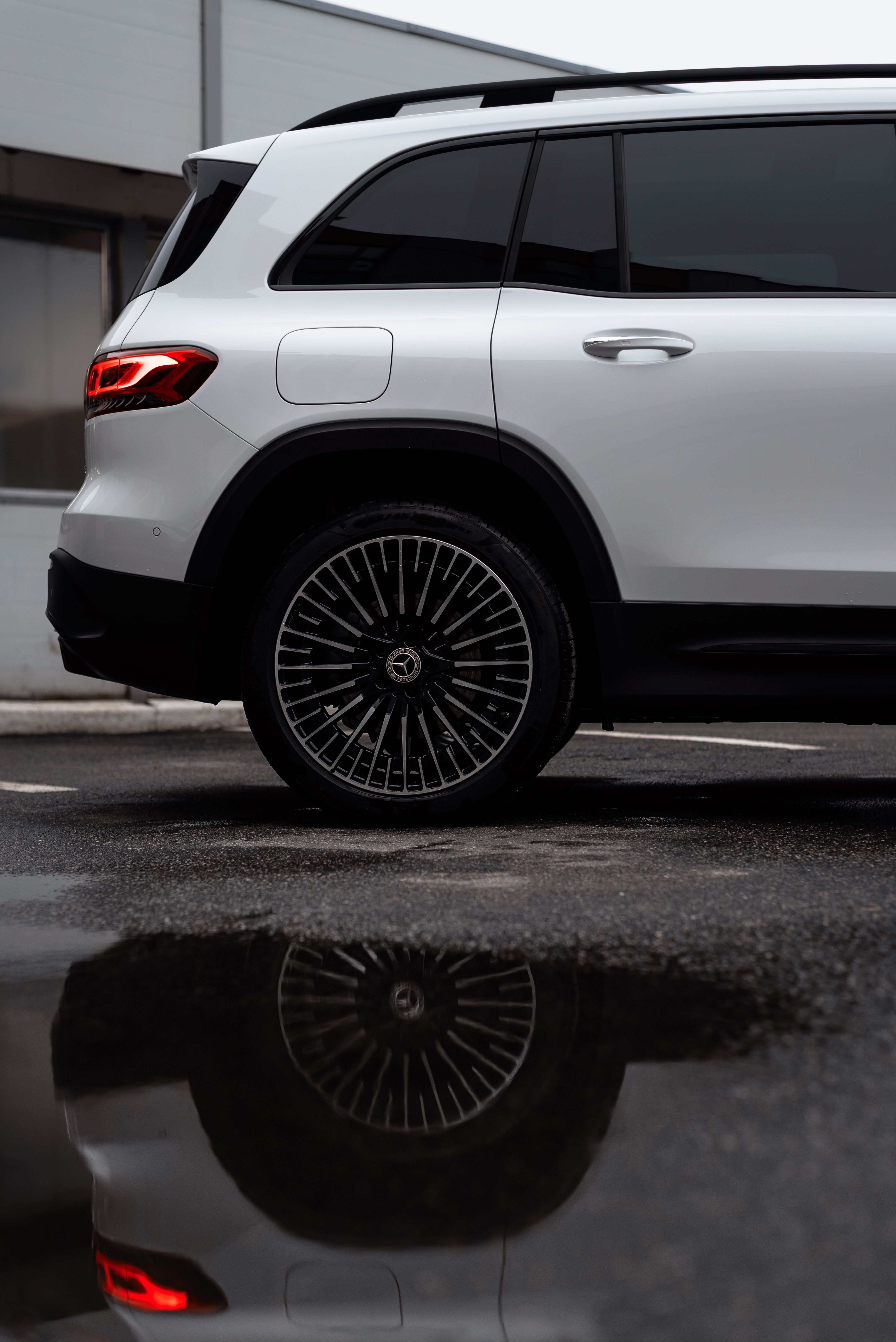 White Mercedes-Benz EQB-Class Car Reflecting in a Rain Poodle · Free ...