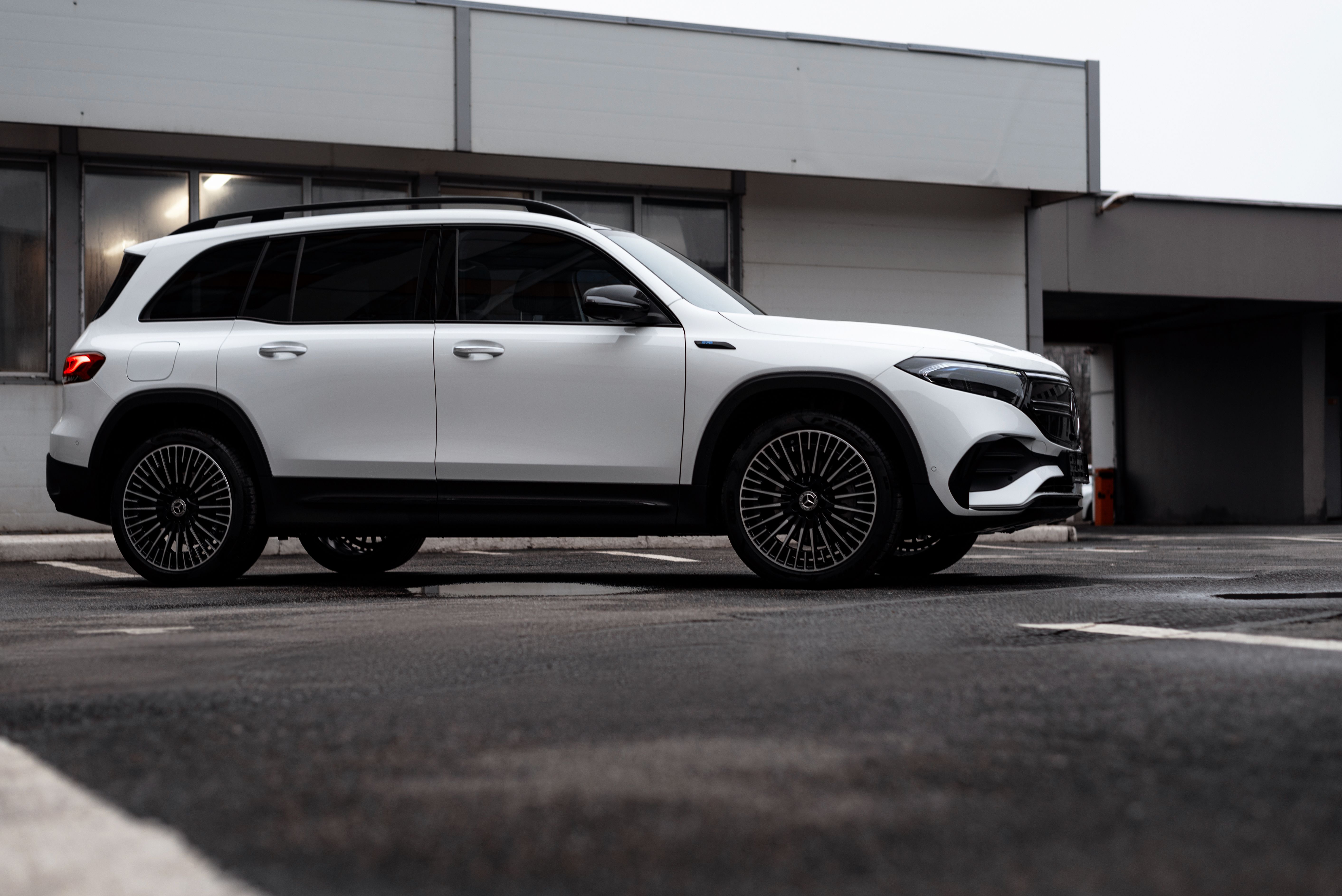 A White Mercedes-Benz EQB on the Parking Lot · Free Stock Photo