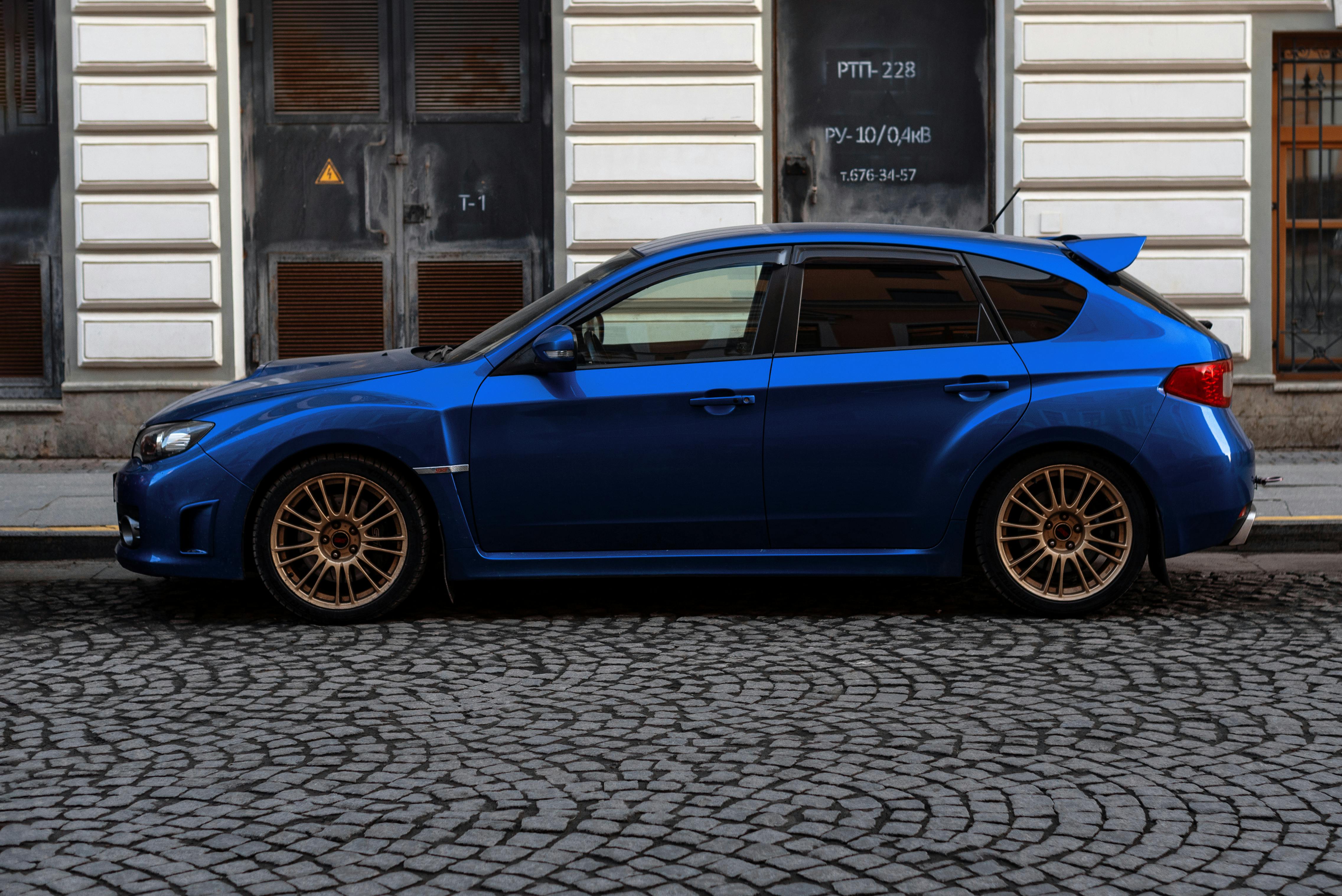Sapphire Blue Subaru Impreza Parked on a Cobblestone Street · Free ...