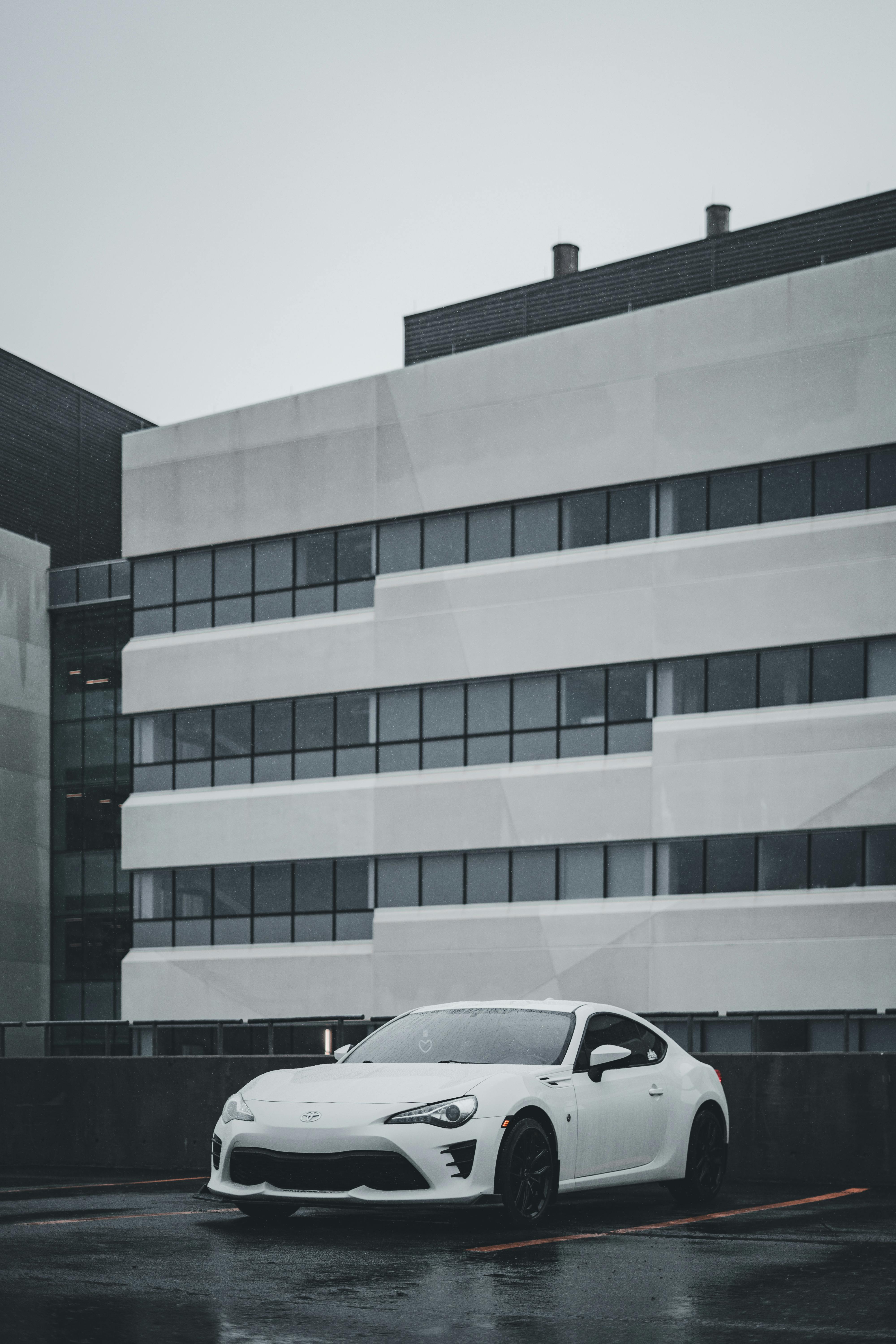 Sports Toyota Car near Building · Free Stock Photo