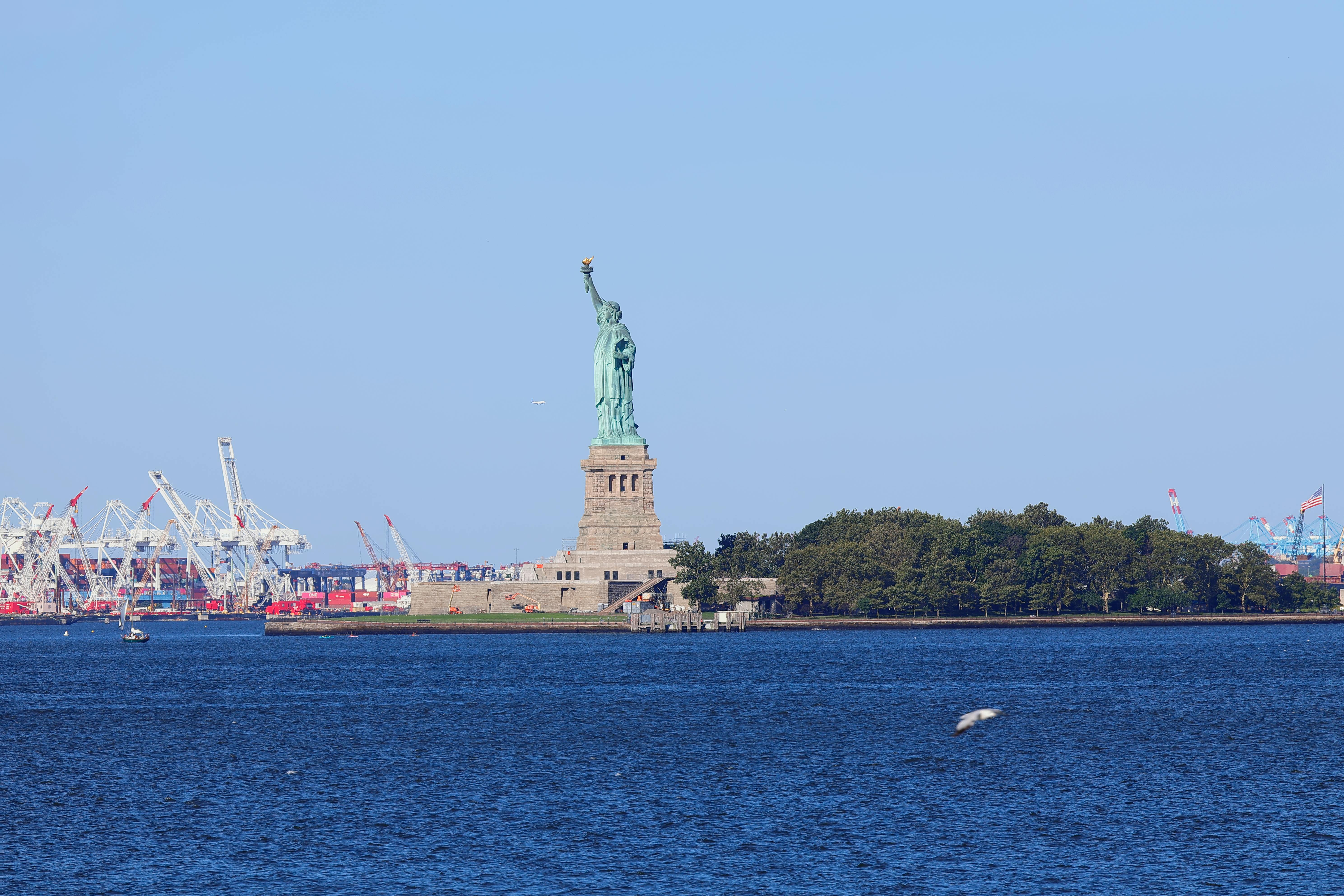 Statue of Liberty Under Blue Skies · Free Stock Photo