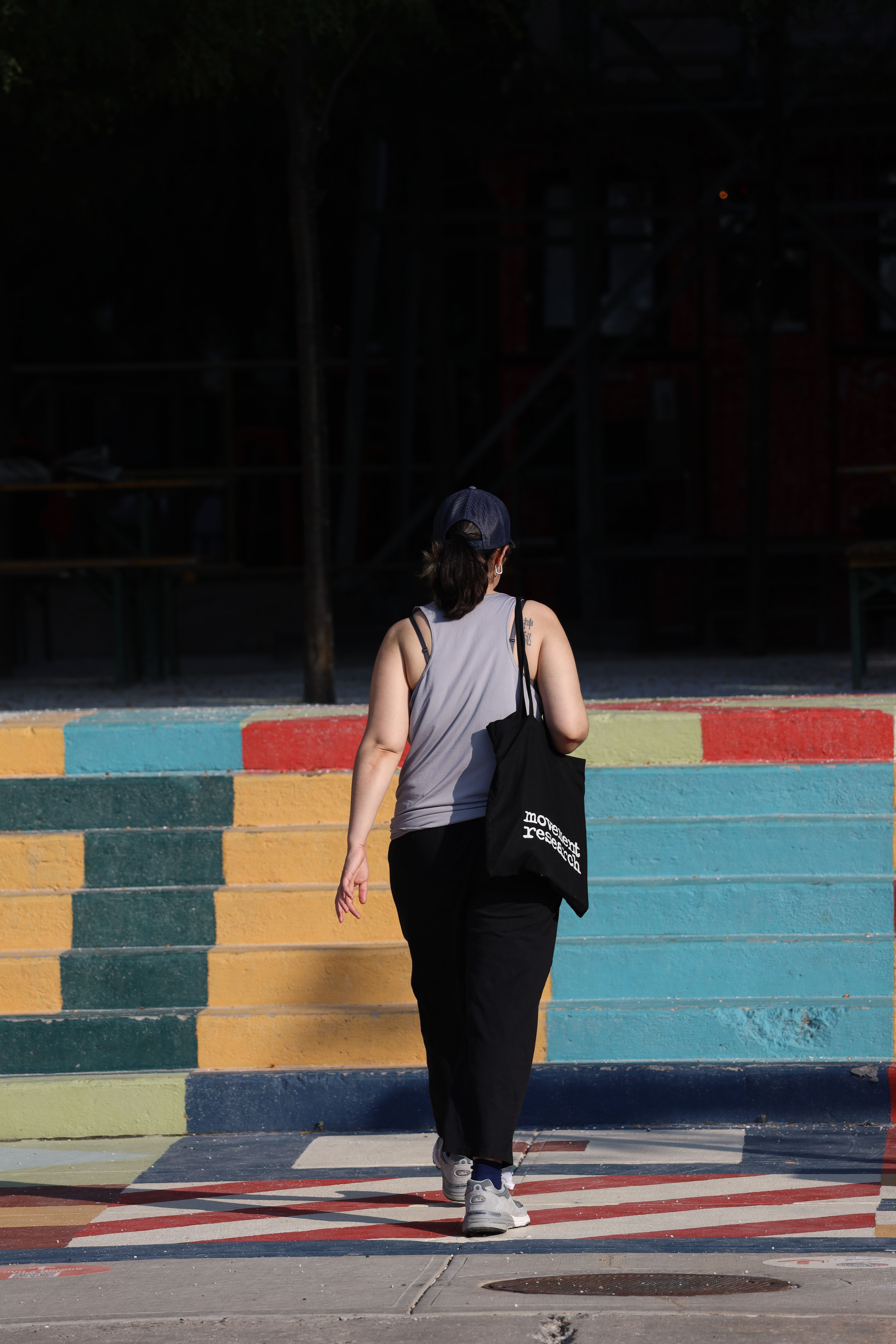 Woman Standing on Stairs · Free Stock Photo