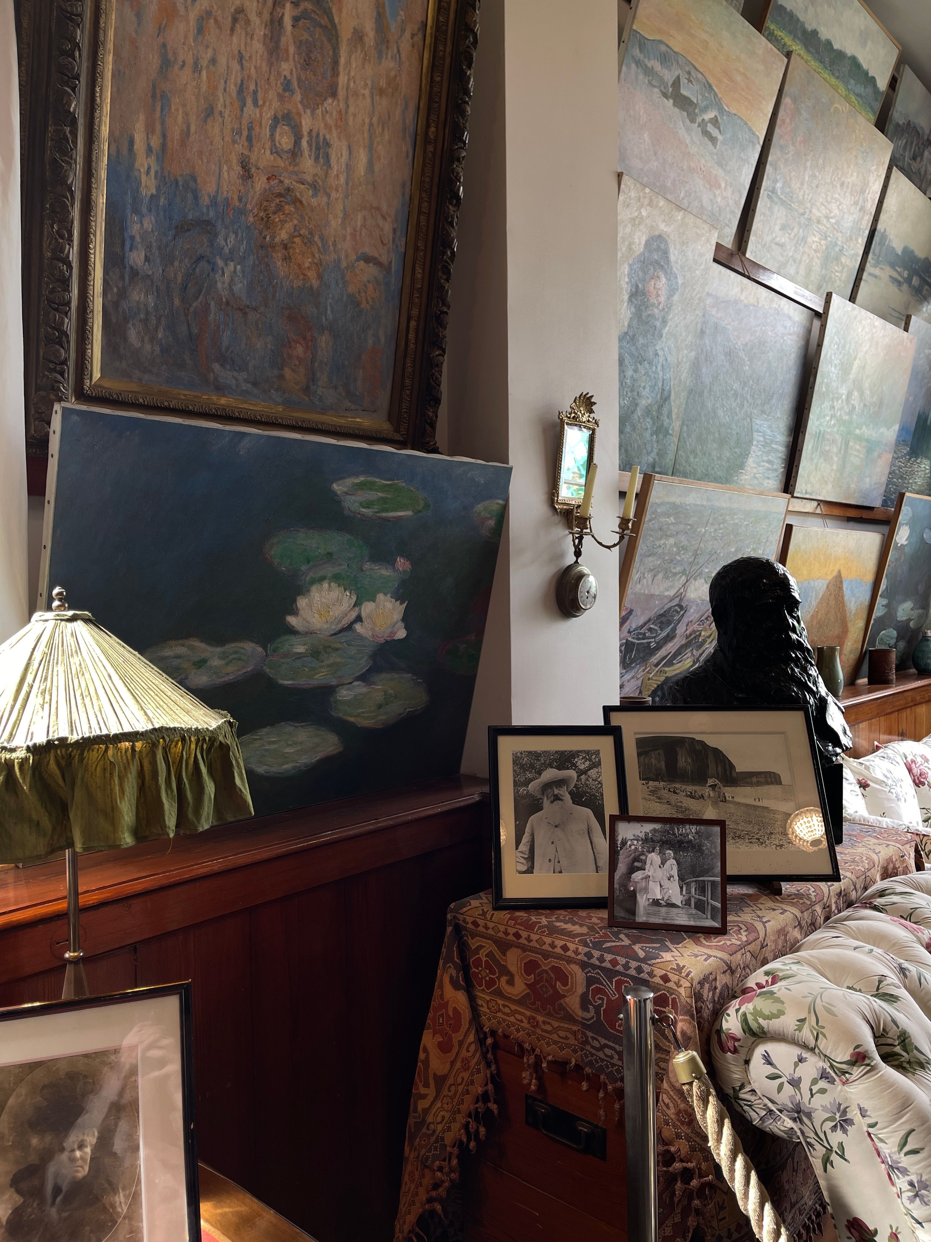 Paintings hanging on blue museum wall · Free Stock Photo