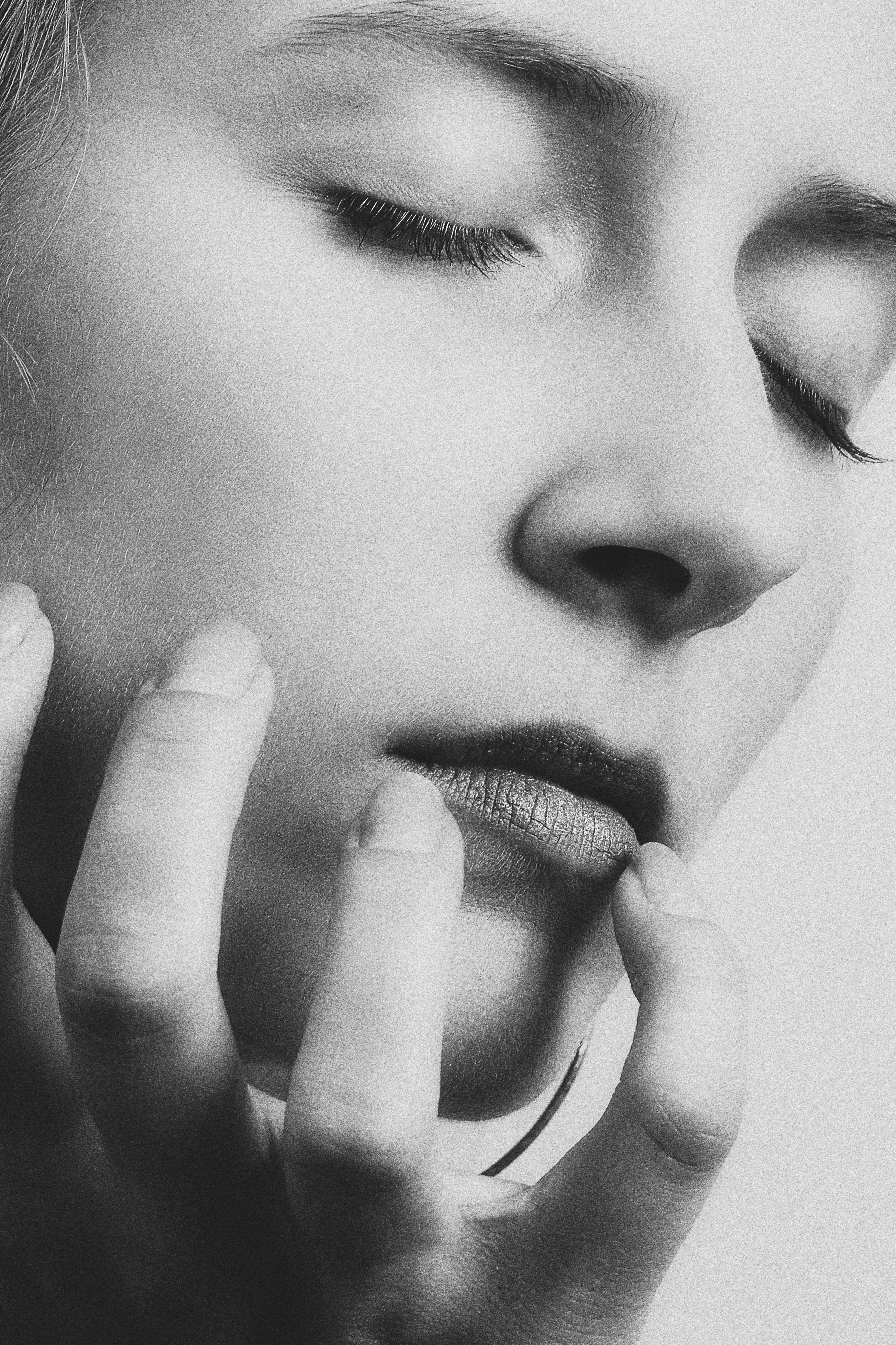 Woman Posing with Hand on Forehead in Black and White · Free Stock Photo